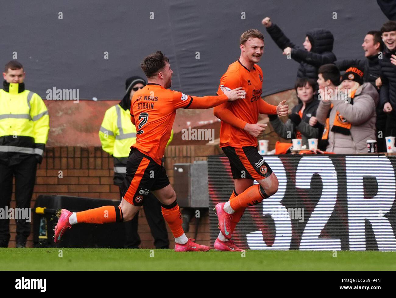 Dundee United's Sam Dalby (right) celebrates with Ryan Strain after ...