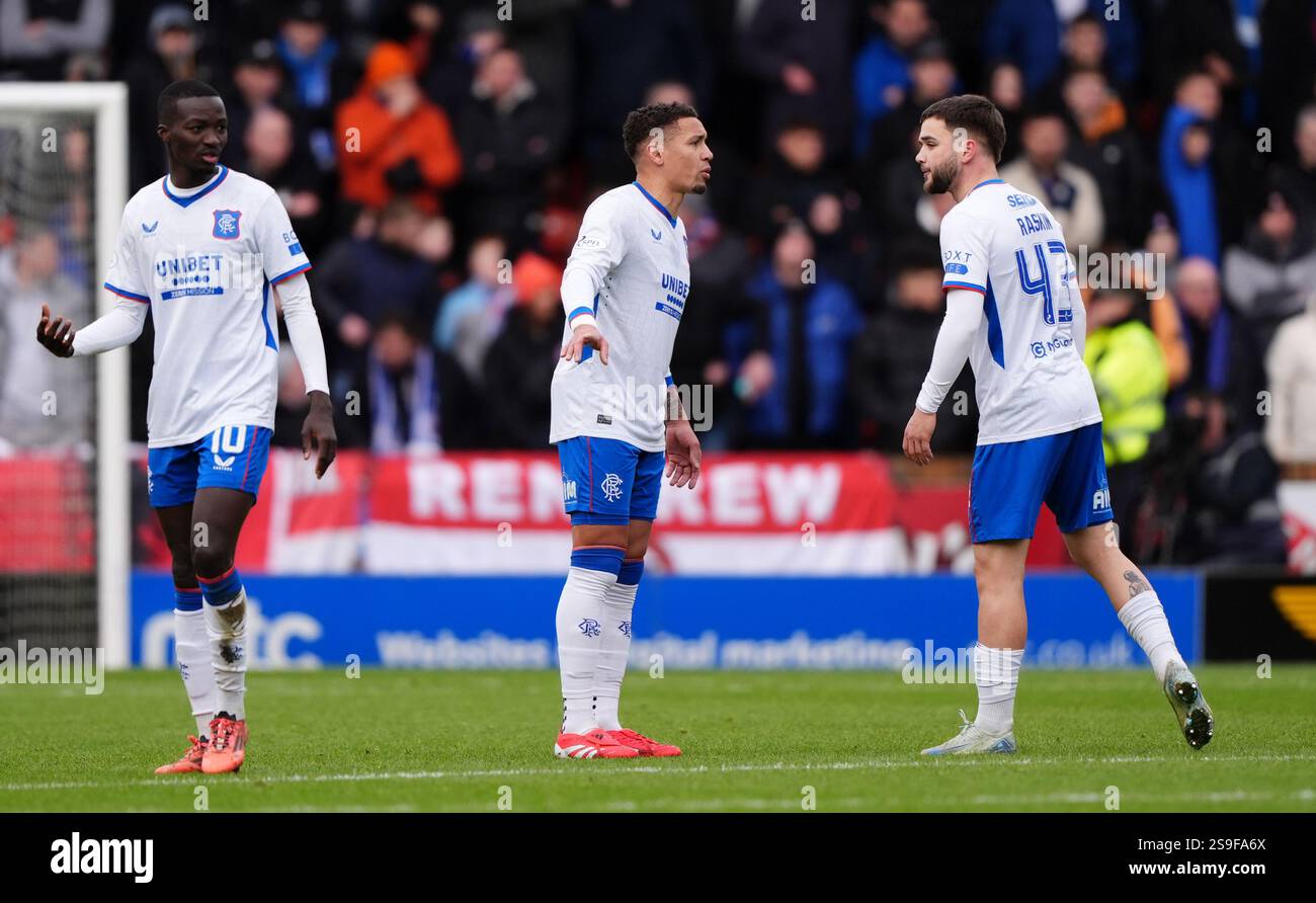 Rangers' James Tavernier (centre) speaks with Nicolas Raskin after ...
