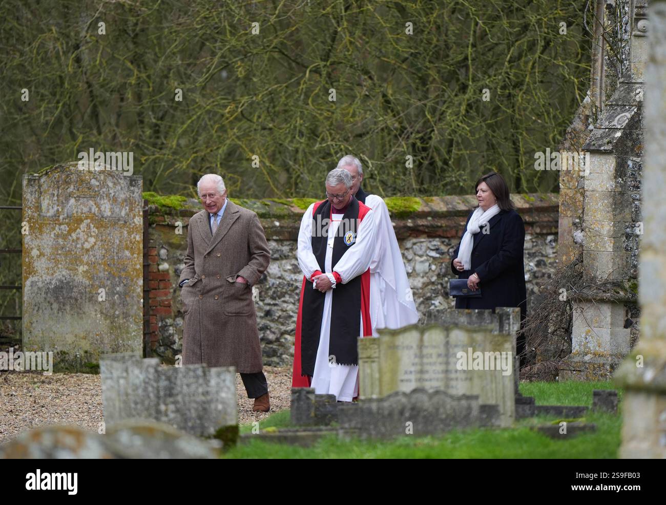 King Charles III (left) leaves after a Sunday church service at St Mary ...