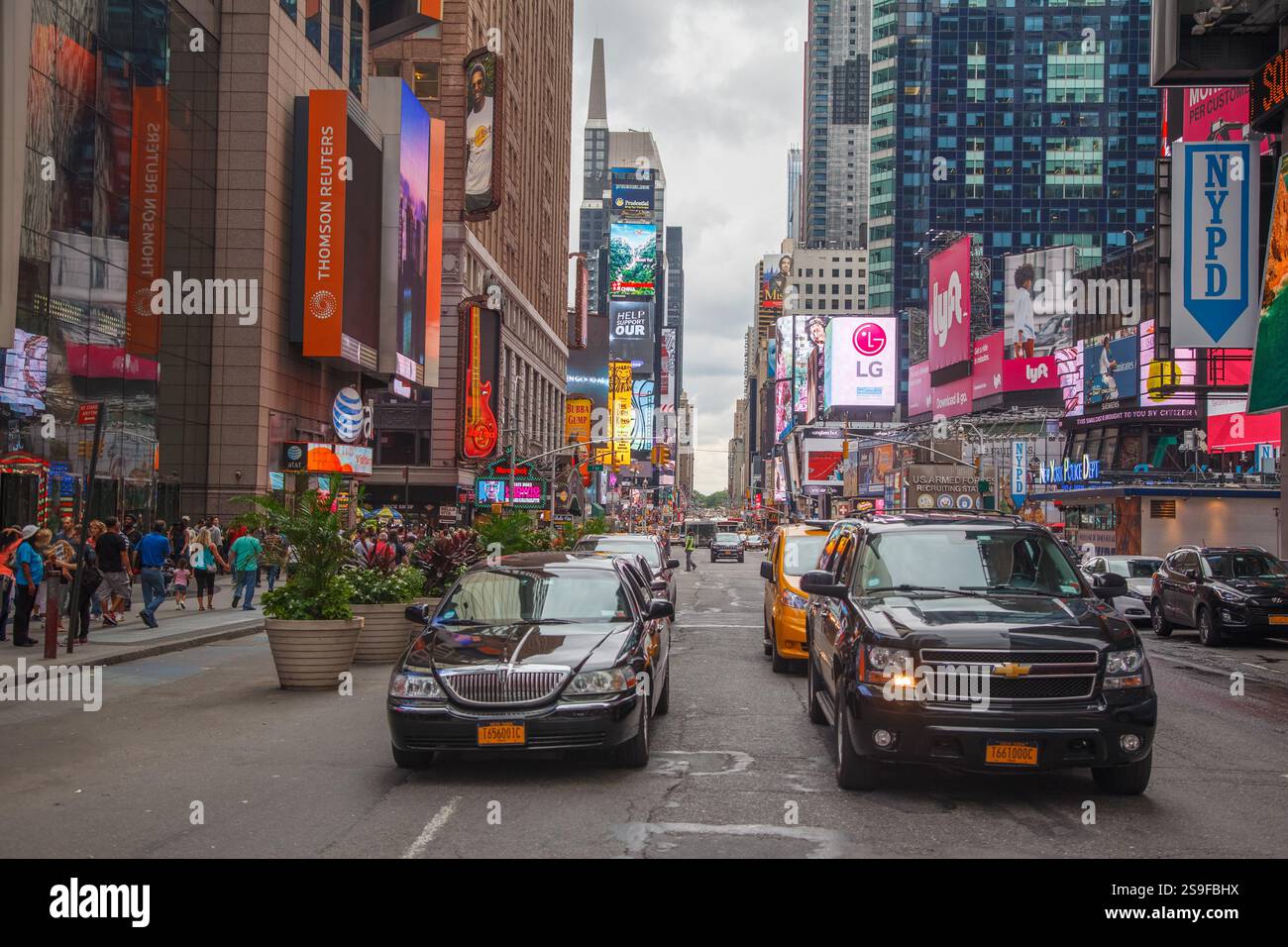 A few cars and the billboards at Times Square in Midtown Manhattan, New ...