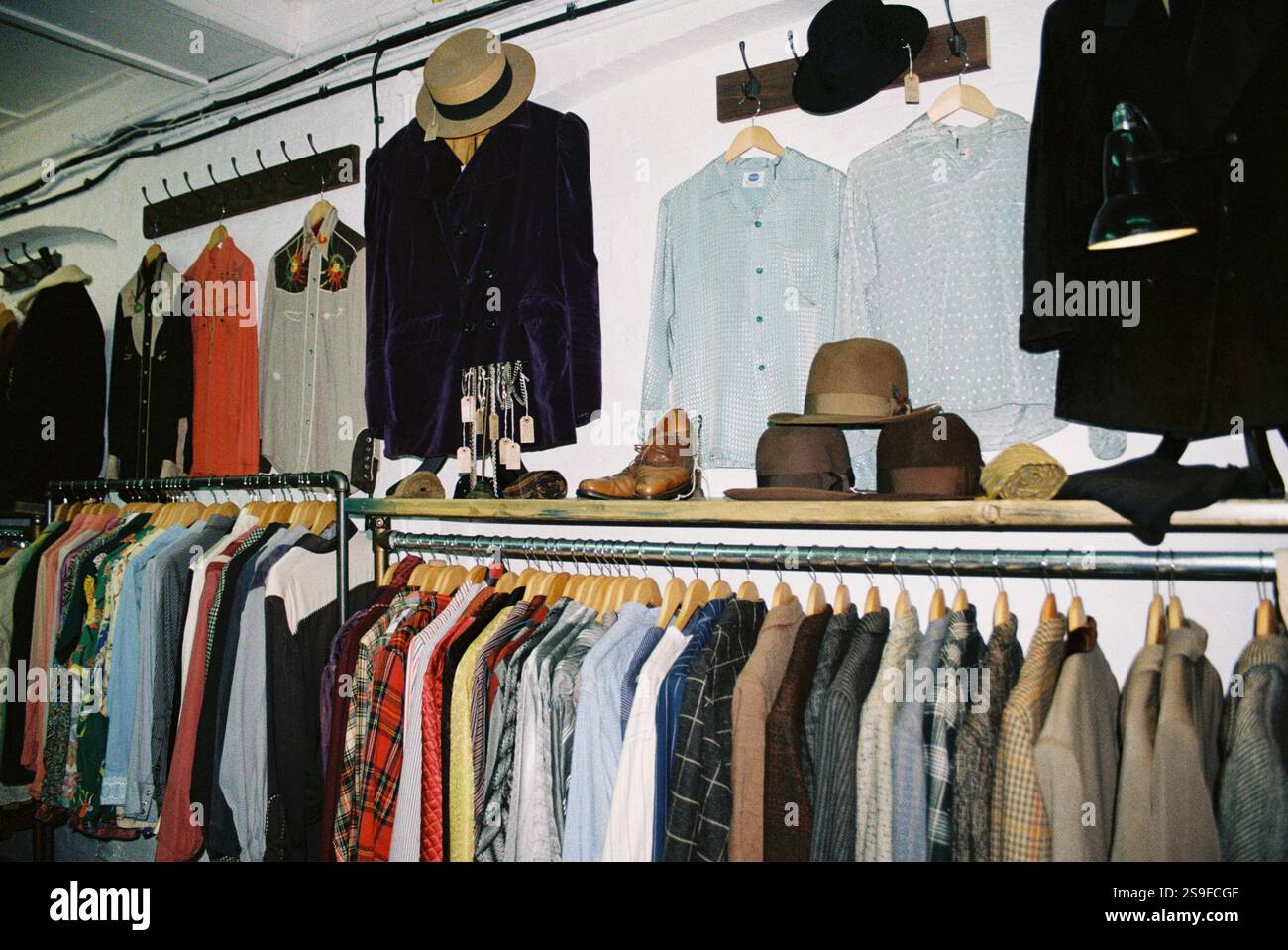 The Vintage Showroom, London. A clothing rack inside men's vintage ...