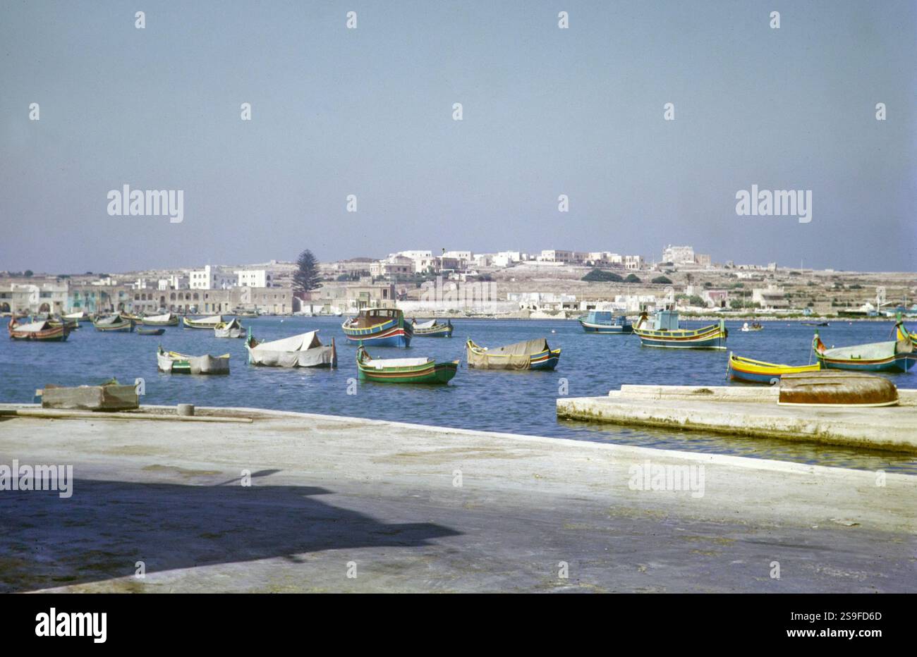 Boats in fishing harbour, Marsaxlokk, Malta, Europe 1971 Stock Photo ...