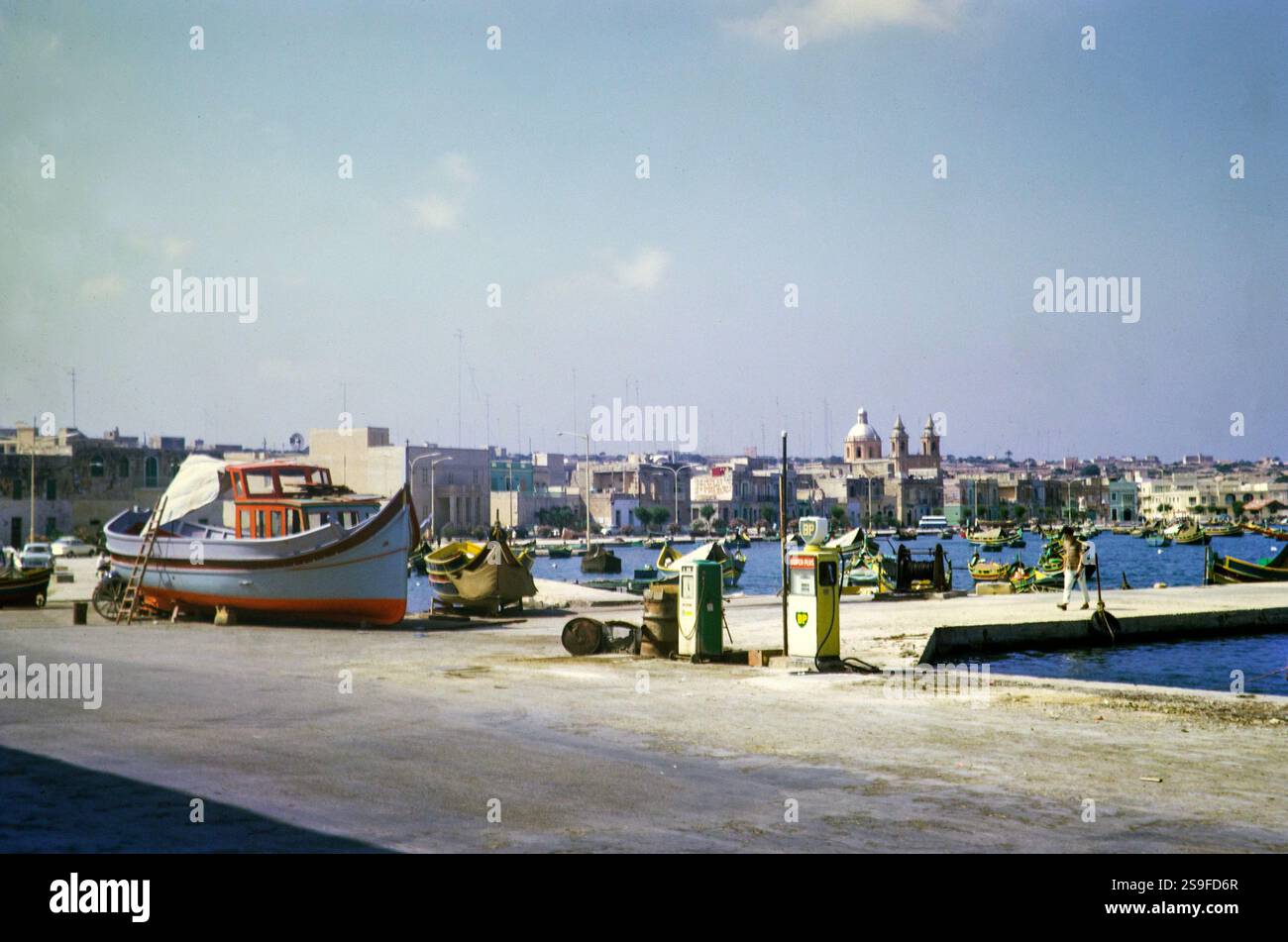 Boats in fishing harbour, Marsaxlokk, Malta, Europe 1971 Stock Photo ...
