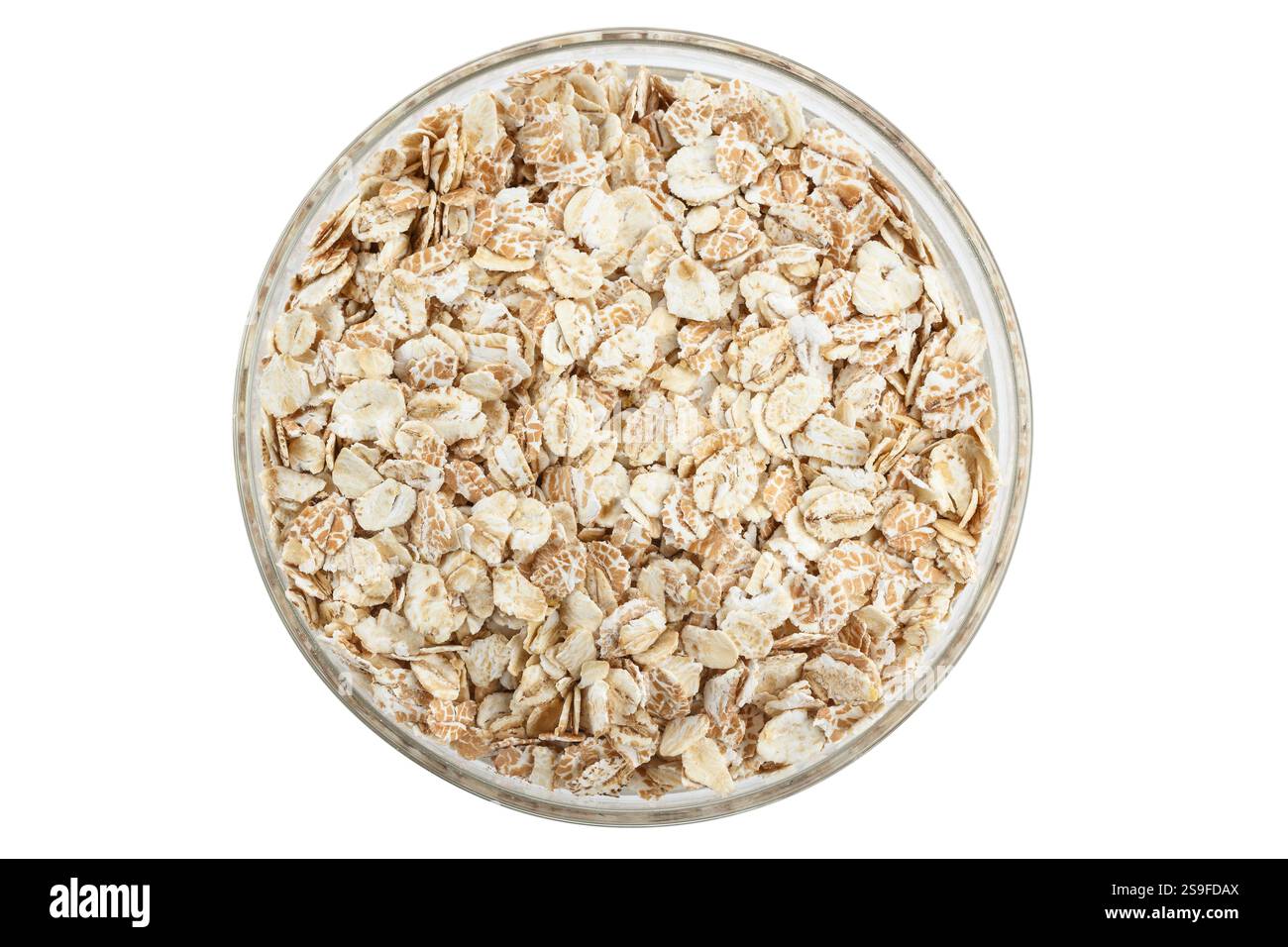 raw oatmeal in a plate, healthy English breakfast, isolated on a white ...
