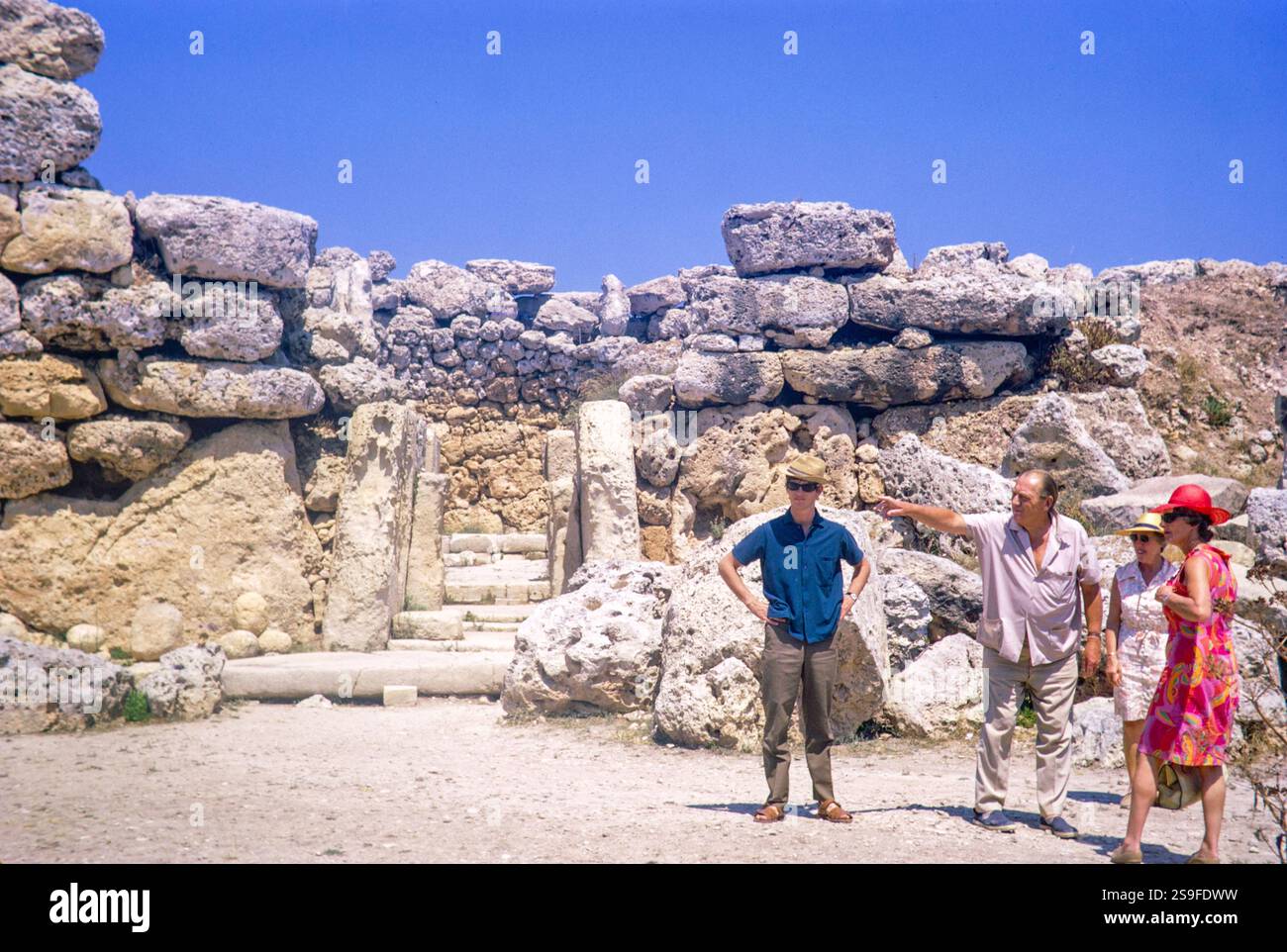 Tourists at prehistoric neolithic archaeological site, megalithic ...