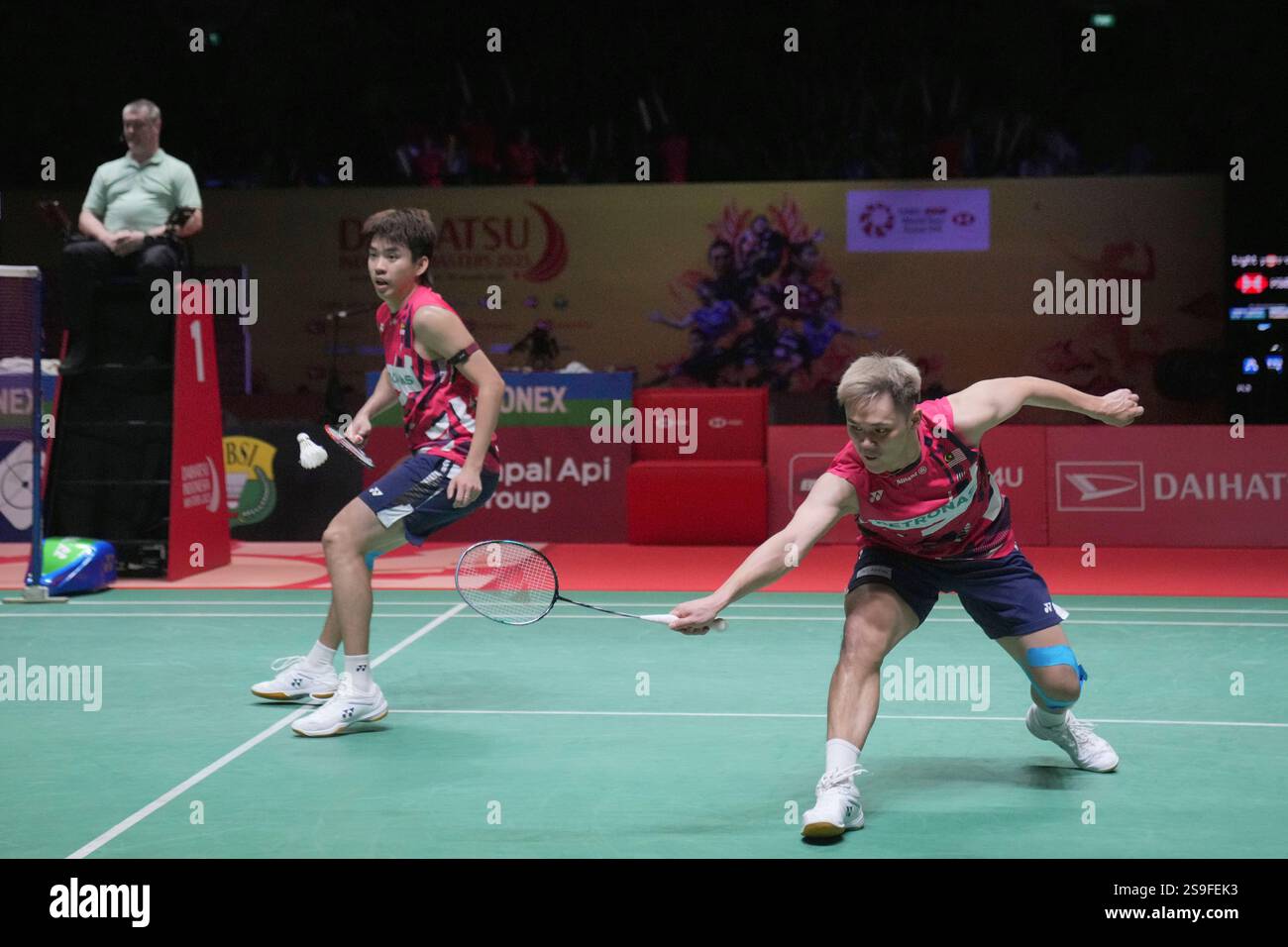 Malaysia's Man Wei Chong, left, and Kai Wun Tee play against Indonesia's Fajar Alfian and ...