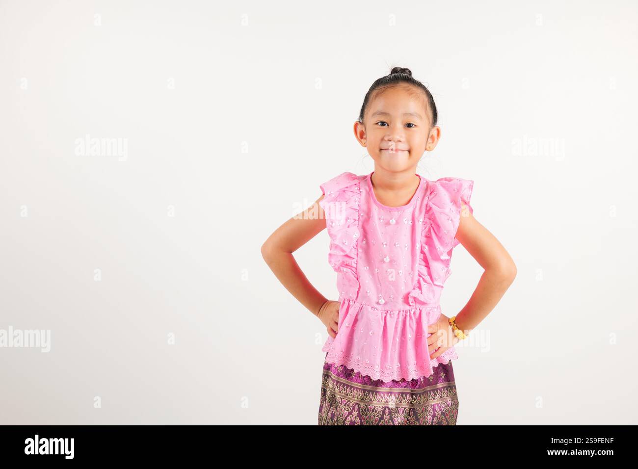 Portrait of Thailand kid girl smiling traditional Thai dress costume ...