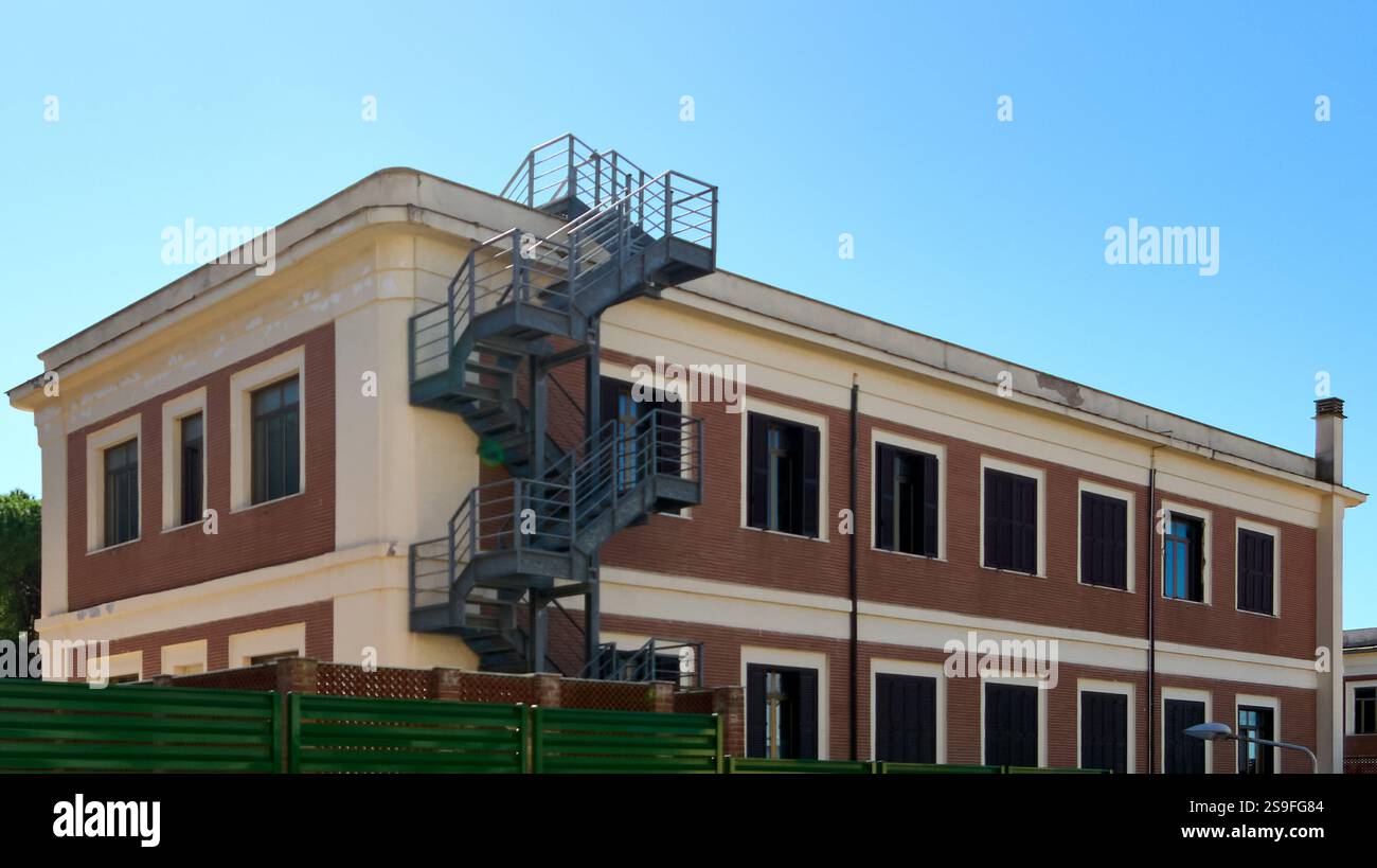 A well-preserved historic building in Civitavecchia, Italy, showcasing ...