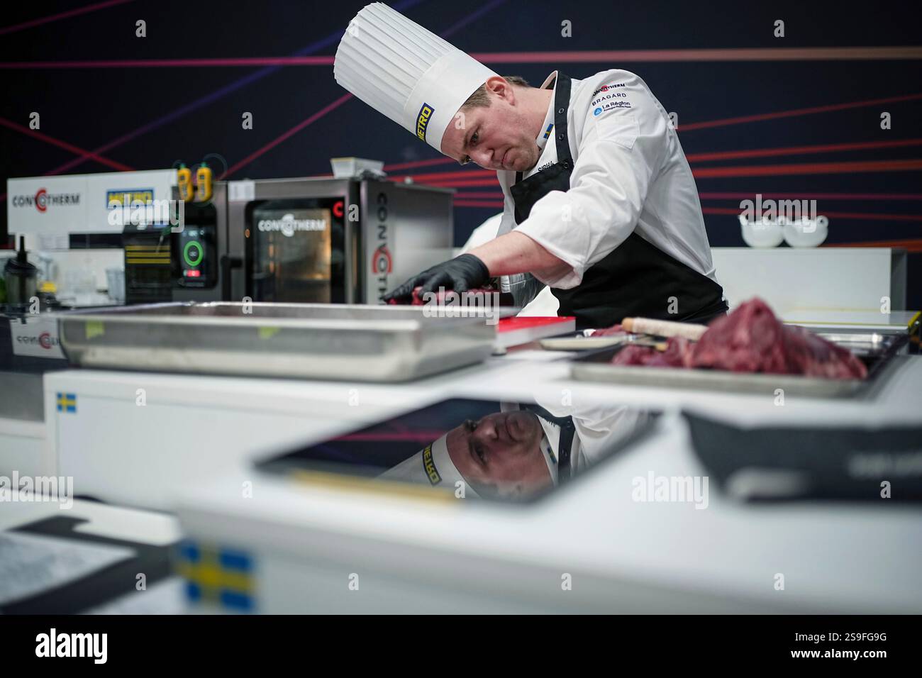 Sweden chef Gustav Leonhardt prepares food during the final of the ...