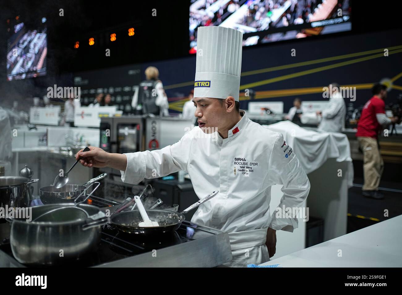 China's chef Yafei Wang prepares food during the final of the "Bocuse d'Or" (Golden Bocuse ...