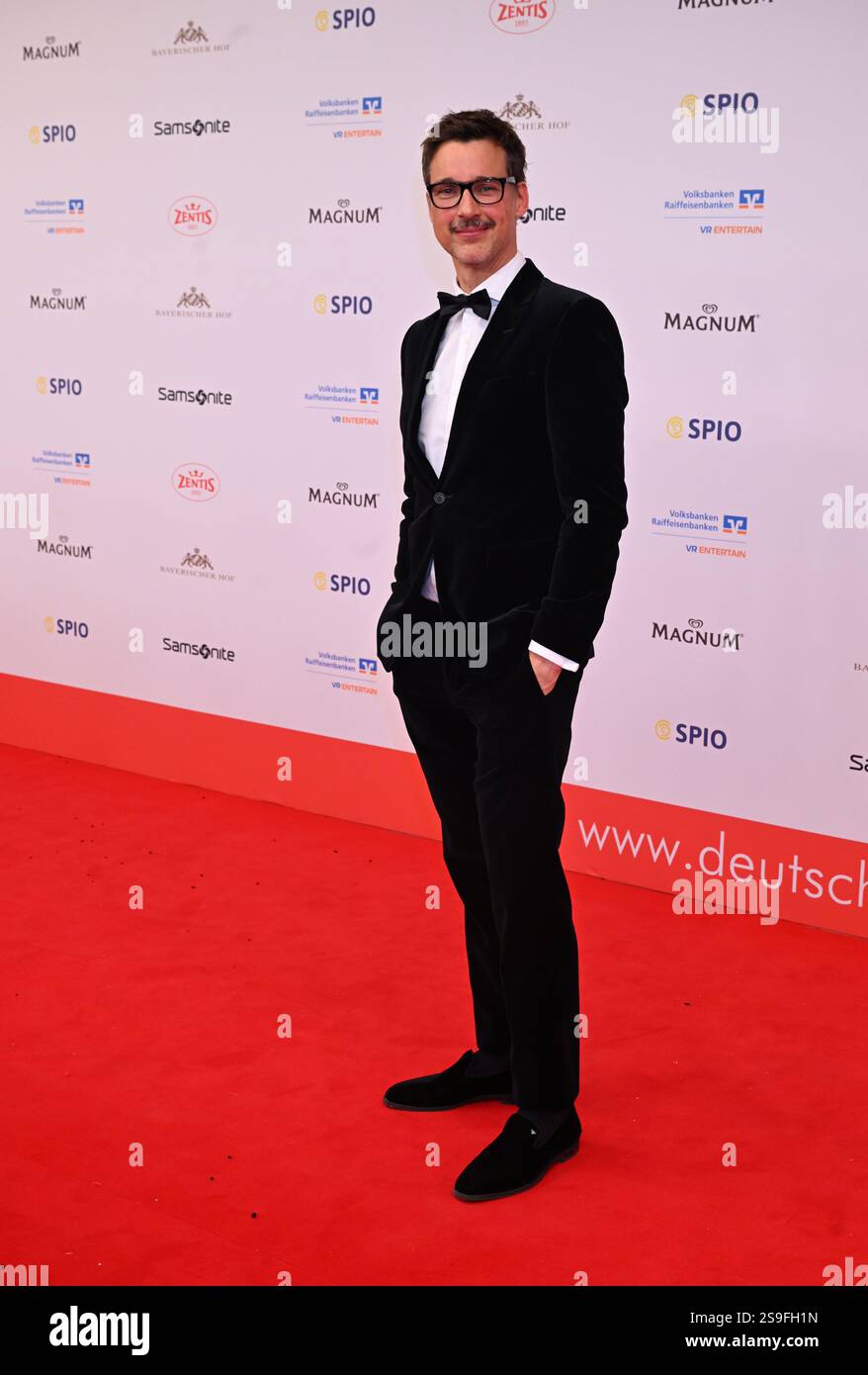 25 January 2025, Bavaria, Munich: Florian David Fitz walks the red ...