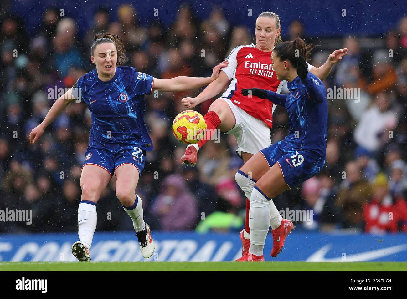 London, England, 26th January 2025. Beth Mead of Arsenal is challenged ...