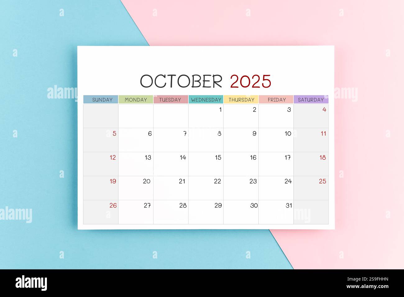 October 2025 calendar page on blue and pink color background Stock ...