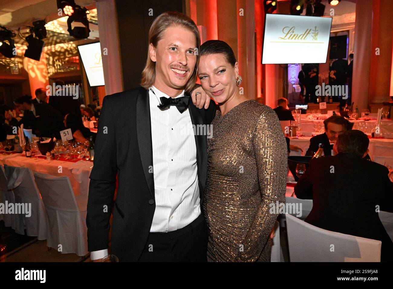 25 January 2025, Bavaria, Munich: Jessica Schwarz and Louis-Freytag ...