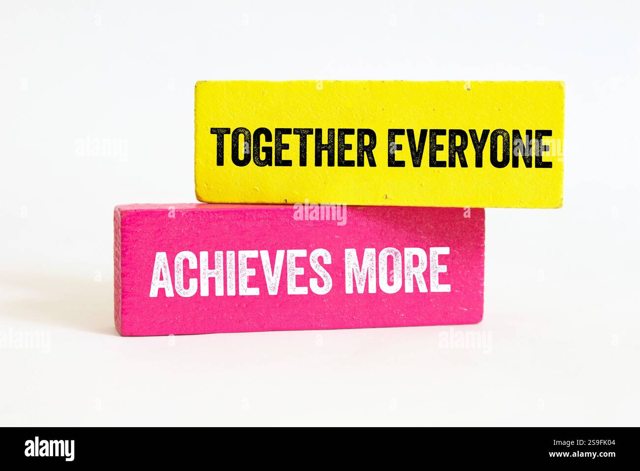 Together everyone achieves more message written on wooden blocks on ...