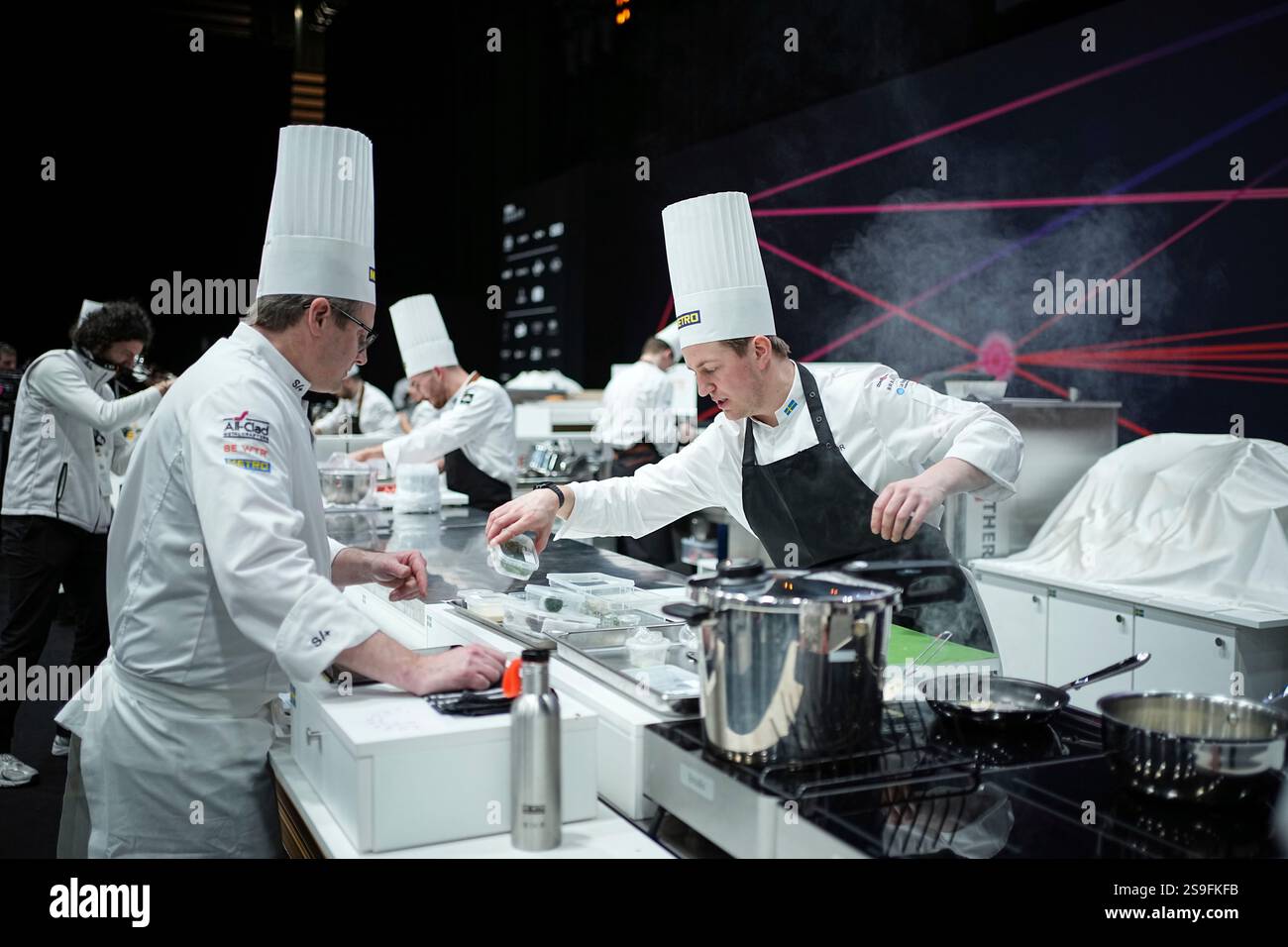 Sweden chef Gustav Leonhardt, right, prepares food during the final of ...