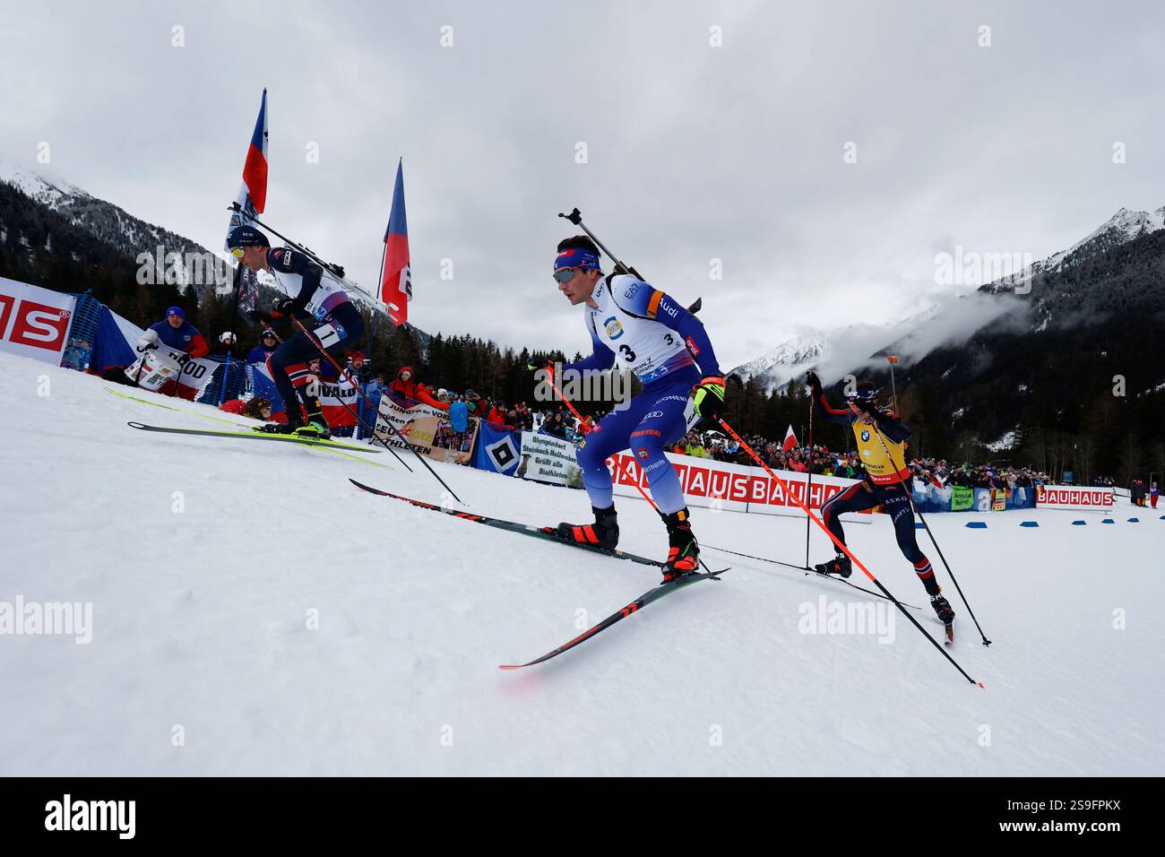 From left, Norway's Tarjei Boe, Italy's Tommaso Giacomel, and Norway's ...