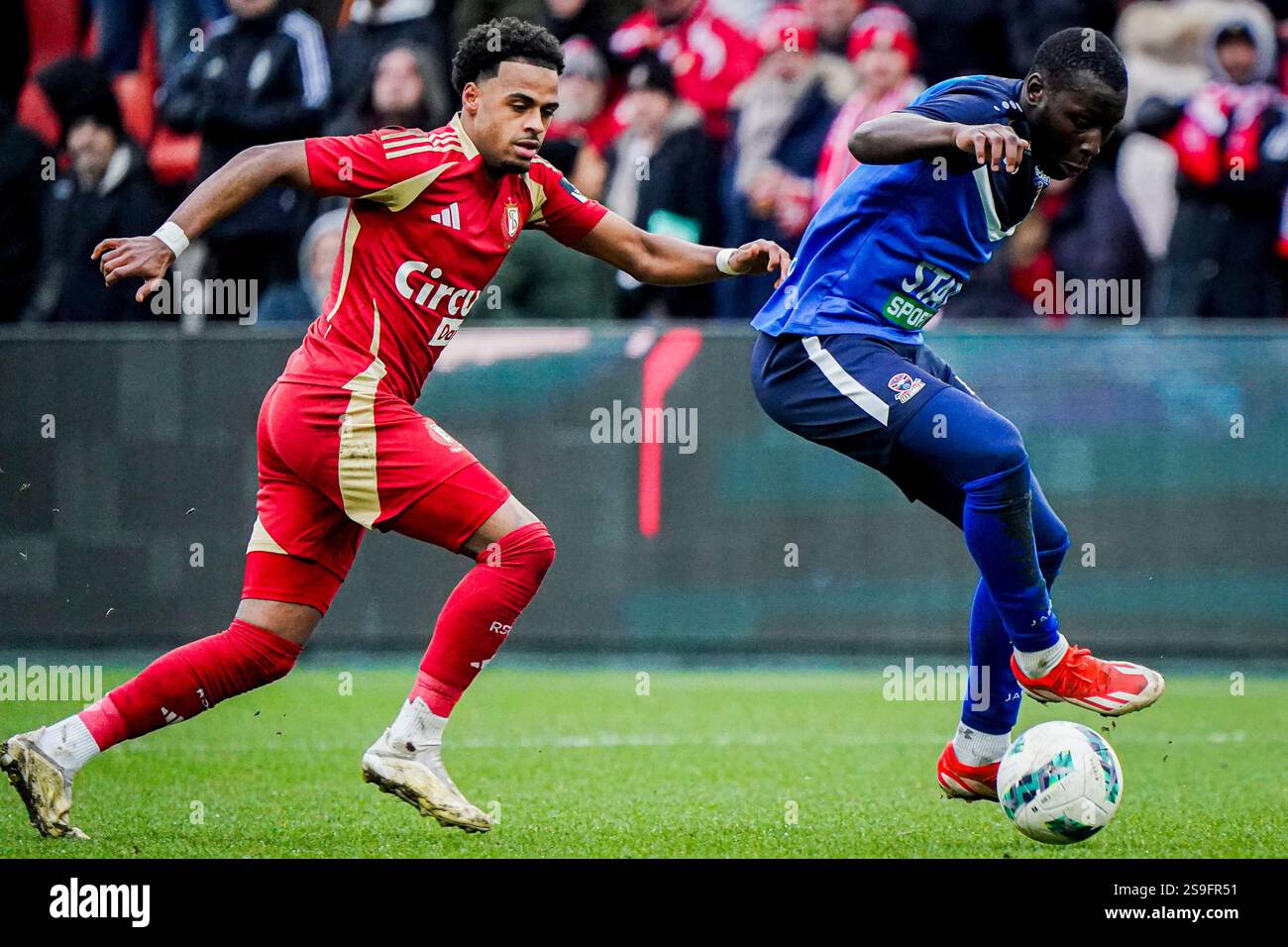 LIEGE, BELGIUM - JANUARY 26: Dembo Sylla of FCV Dender EH battles for ...