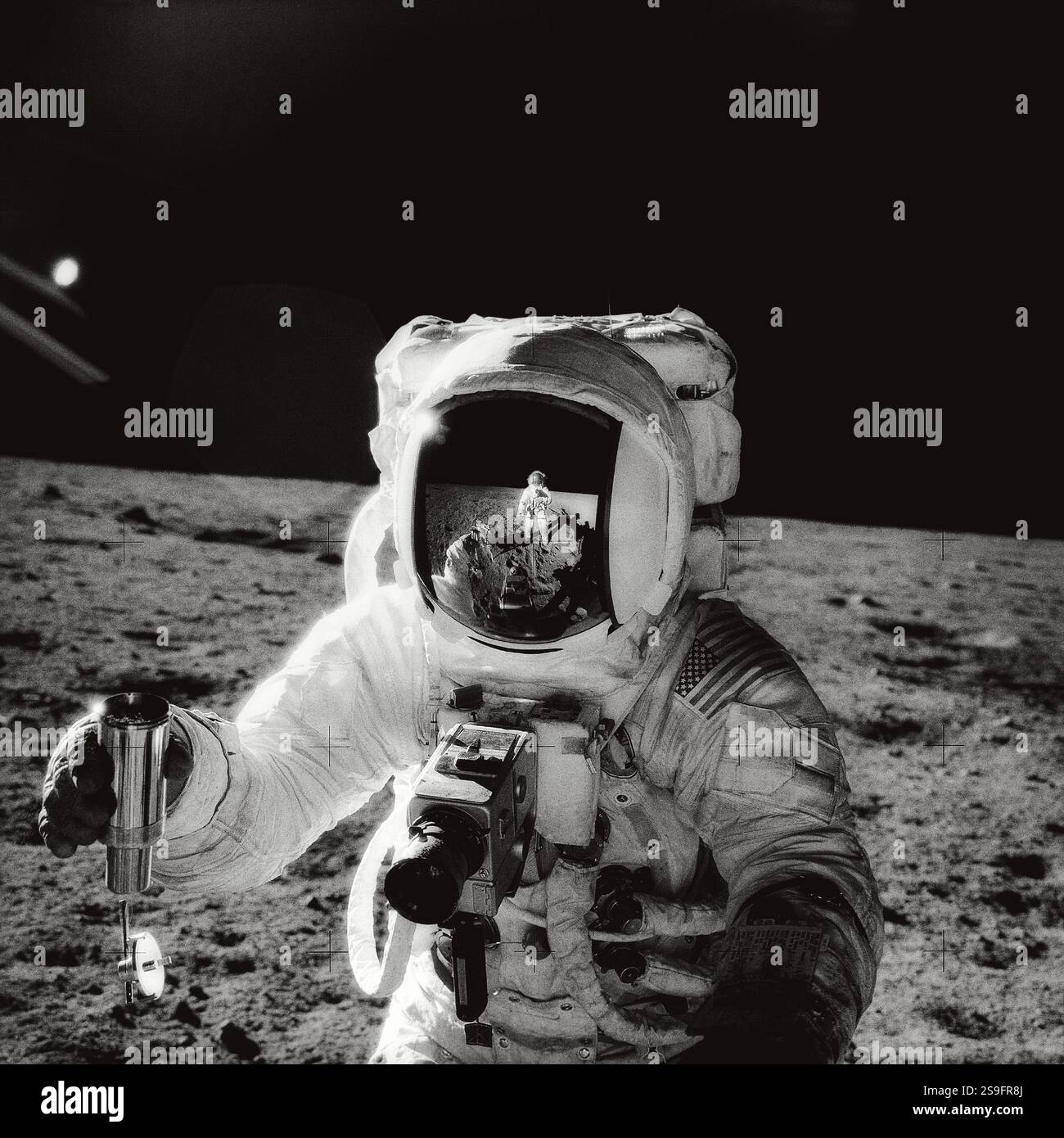 Astronaut Alan Bean holds Special Environmental Sample Container ...