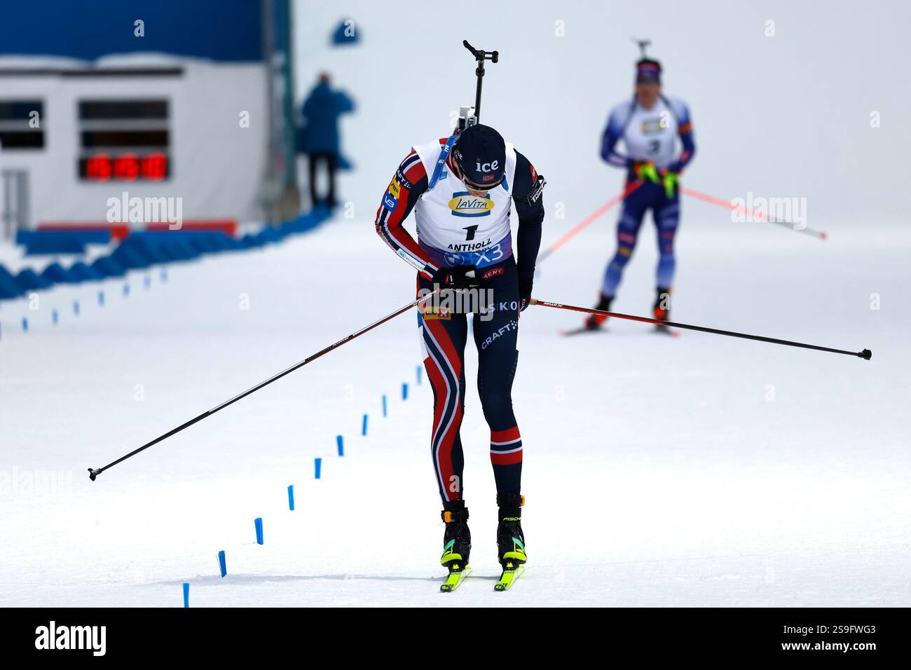 Second placed Norway's Tarjei Boe crosses the finish line of a Biathlon ...