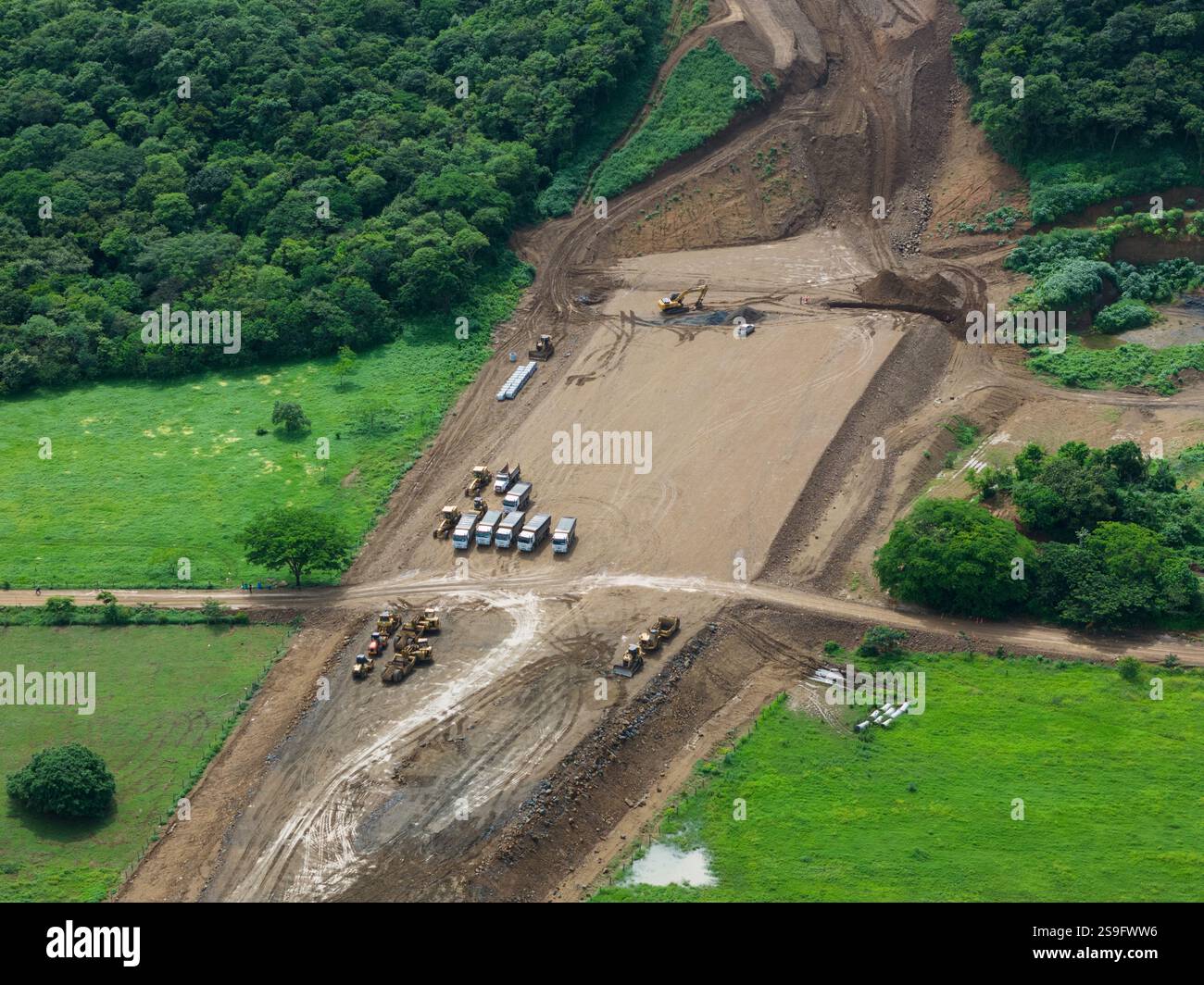 Building new road in green landscape aerial drone view Stock Photo - Alamy