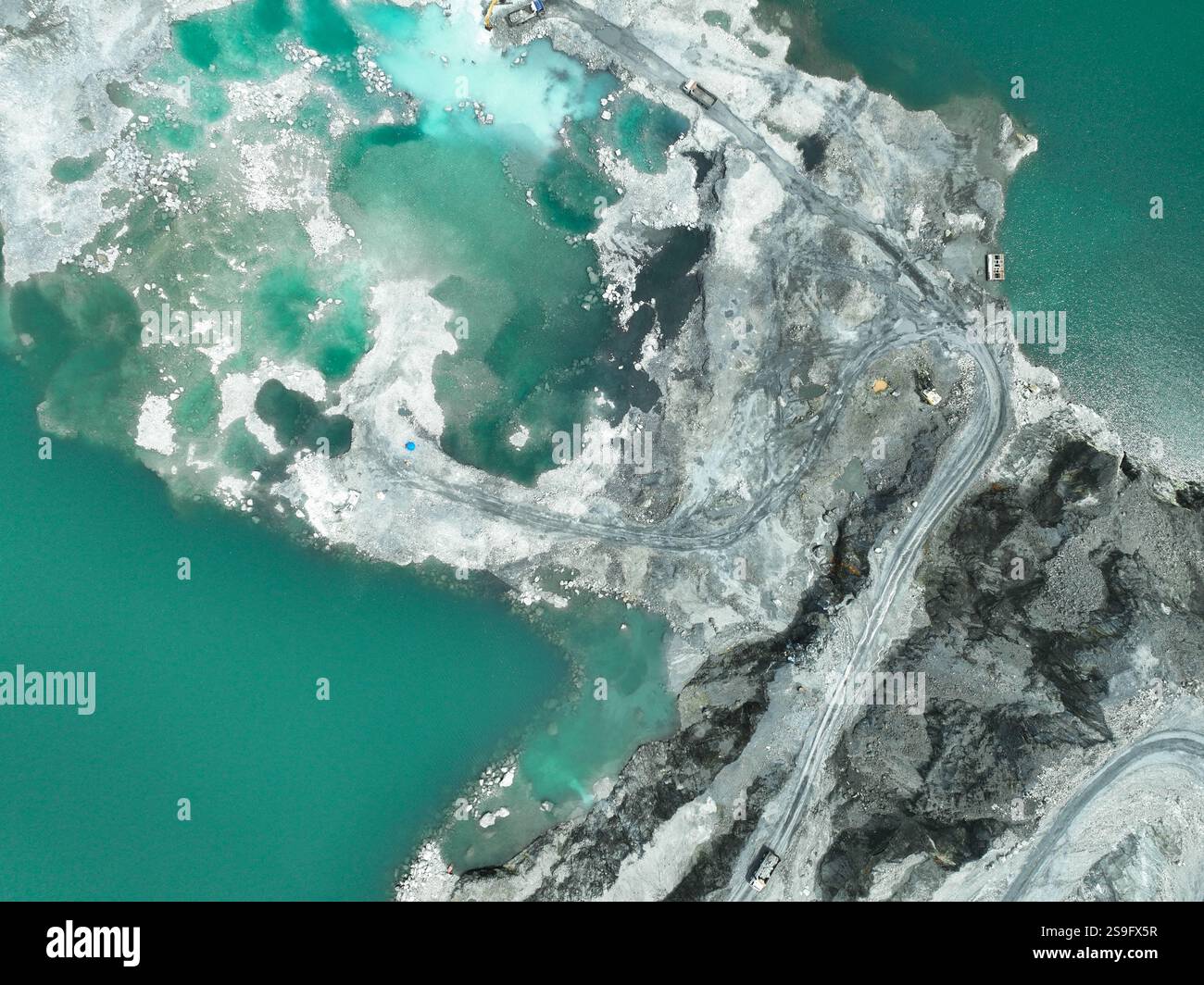 Open pit mine industry. Limestone quarry with backhoe and truck in ...