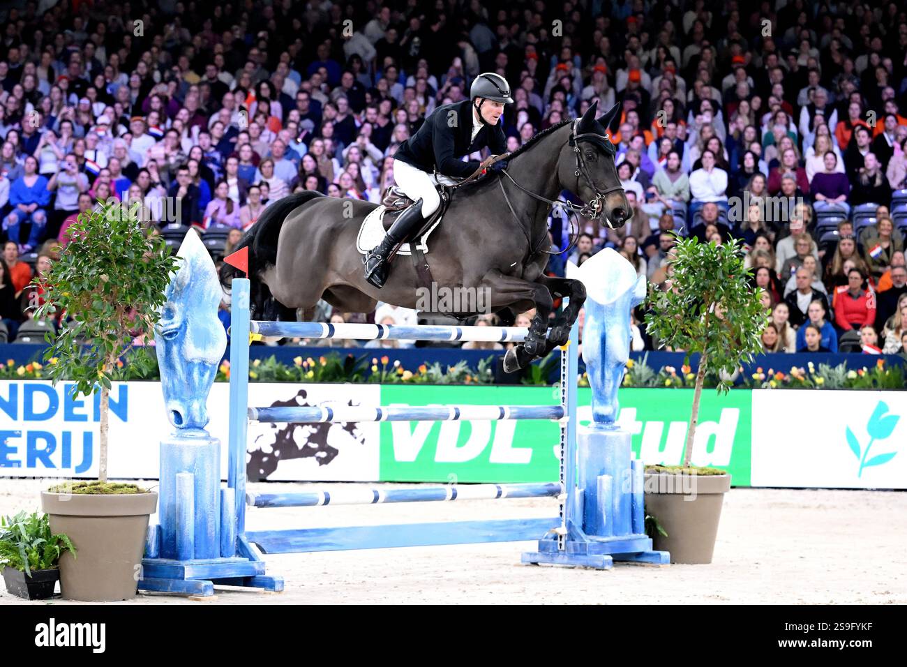 AMSTERDAM - Michael Greeve on Denver during the FEI World Cup show ...