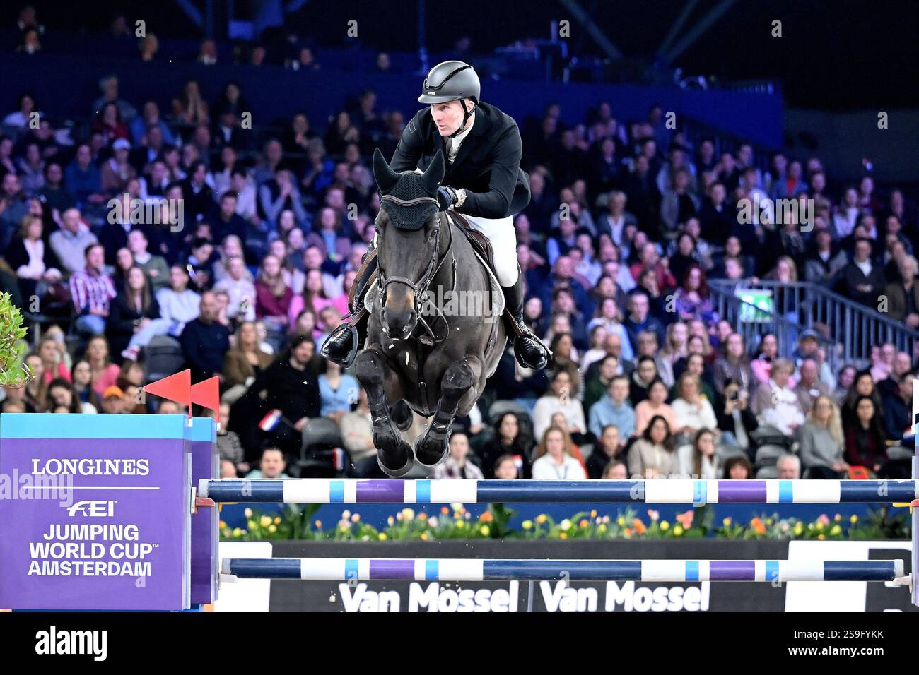 AMSTERDAM - Michael Greeve on Denver during the FEI World Cup show ...