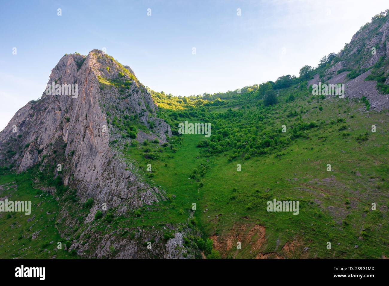 mountain landscape of romania in springtime. green environment. rock ...