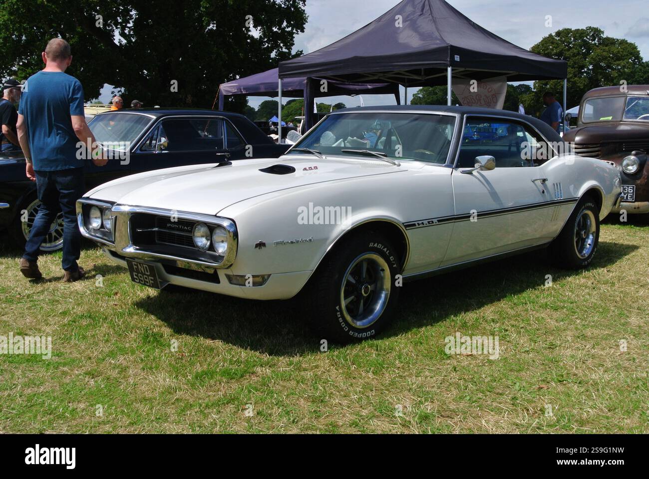 A 1968 Pontiac Firebird parked on display at the 49th Historic Vehicle ...