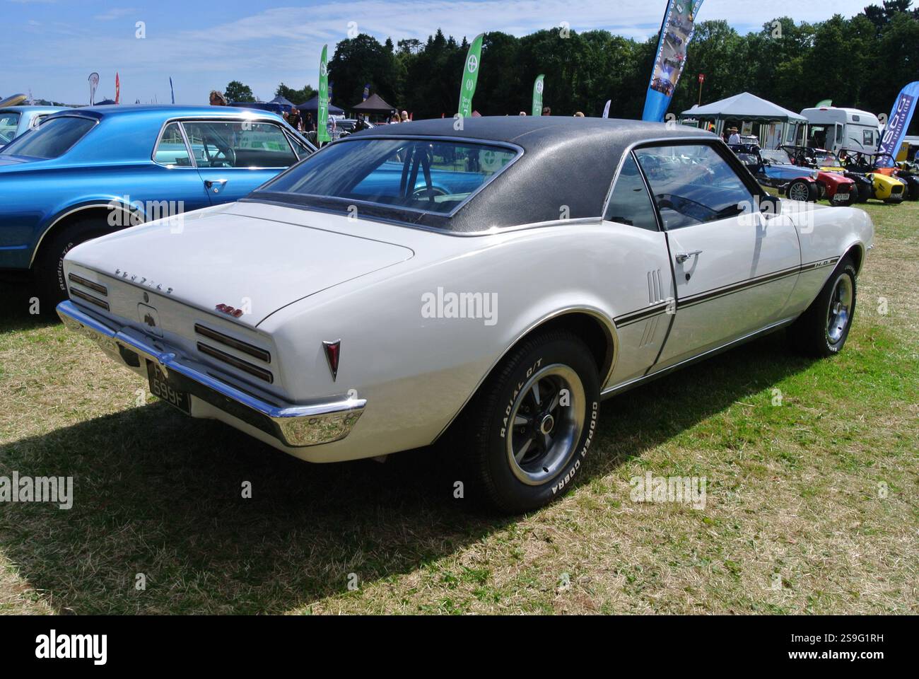 A 1968 Pontiac Firebird parked on display at the 49th Historic Vehicle ...