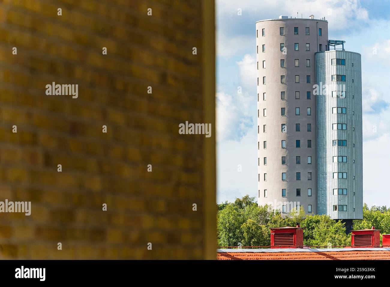 An old water tower has been converted into a modern residential ...