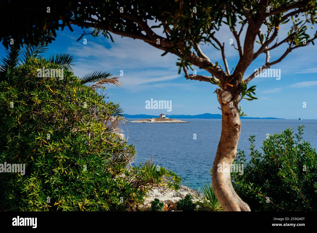 Pokonji Dol island & lighthouse, Pokonji Beach, Hvar, Croatia Stock ...