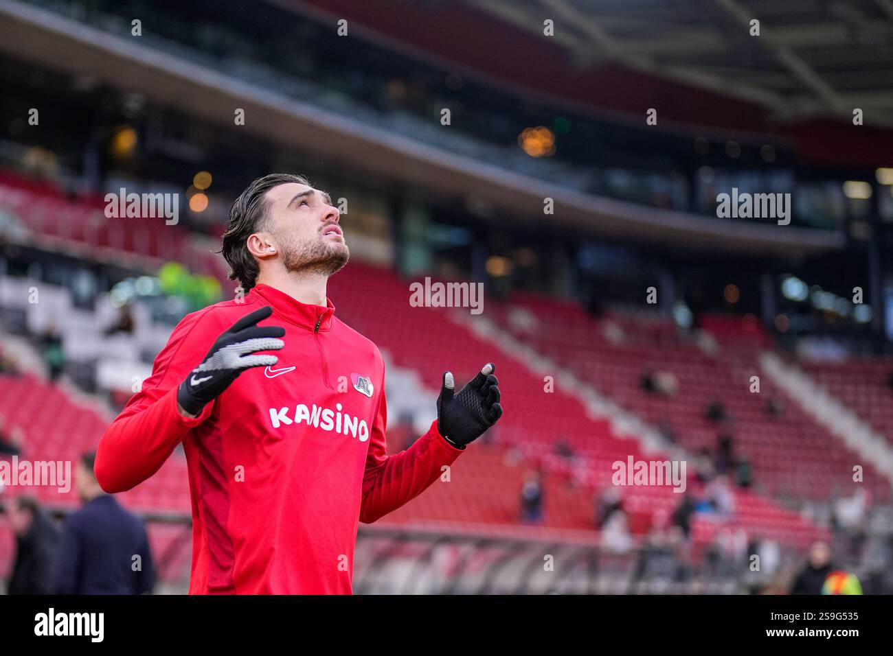 ALKMAAR, NETHERLANDS - JANUARY 26: Troy Parrott of AZ enters the field ...