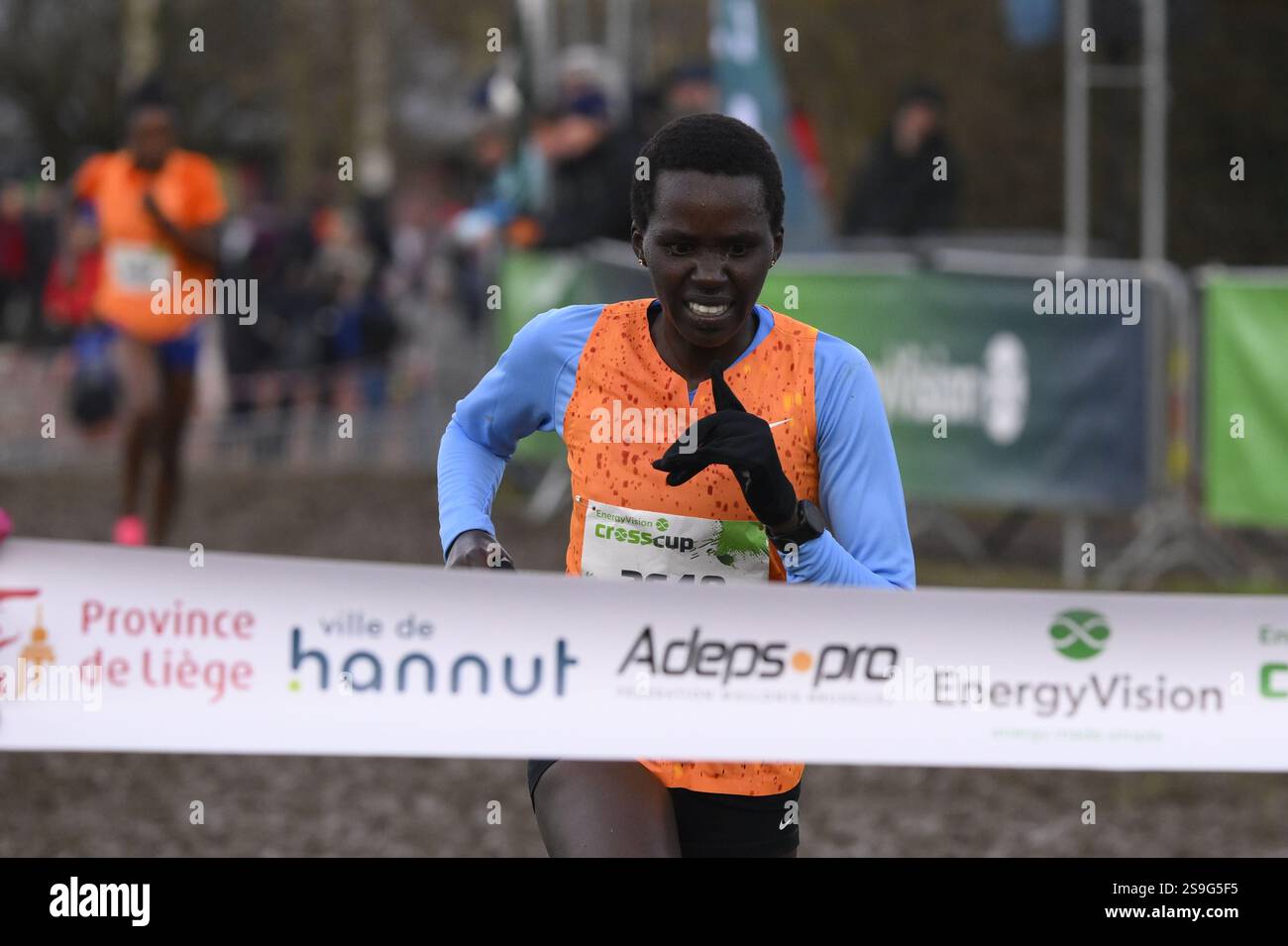 Kenyan Sheila Jebet crosses the finish line to win the women's race at ...