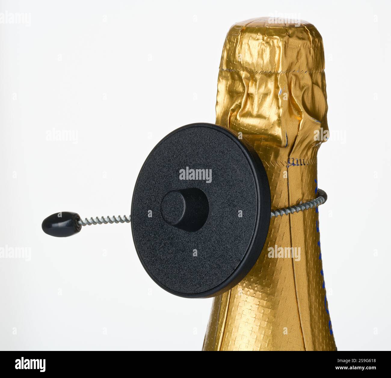 Wine bottle with a security tag fixed to the neck Stock Photo - Alamy