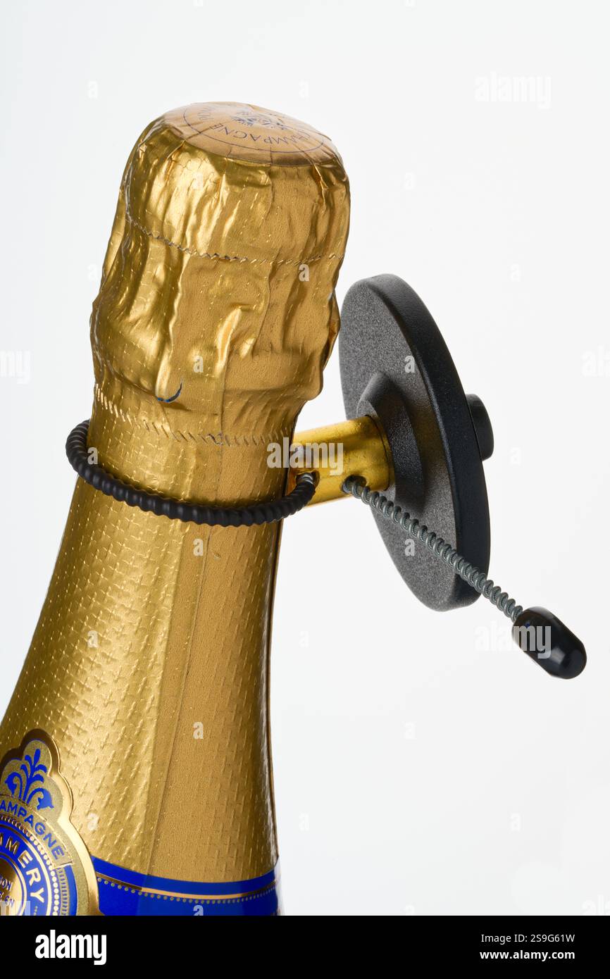 Wine bottle with a security tag fixed to the neck Stock Photo - Alamy