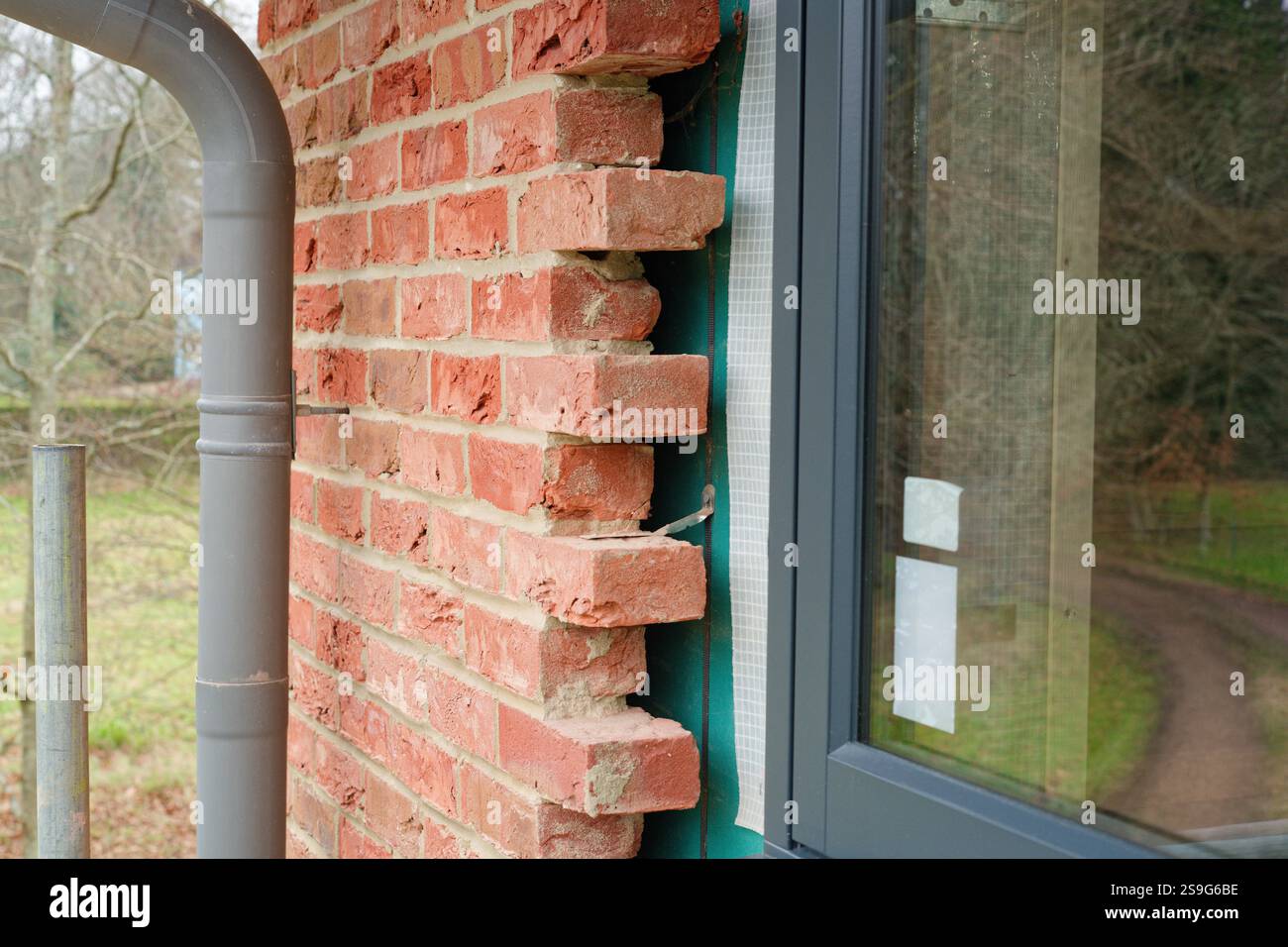 Building ones own home. House building work. Construction of a timber ...