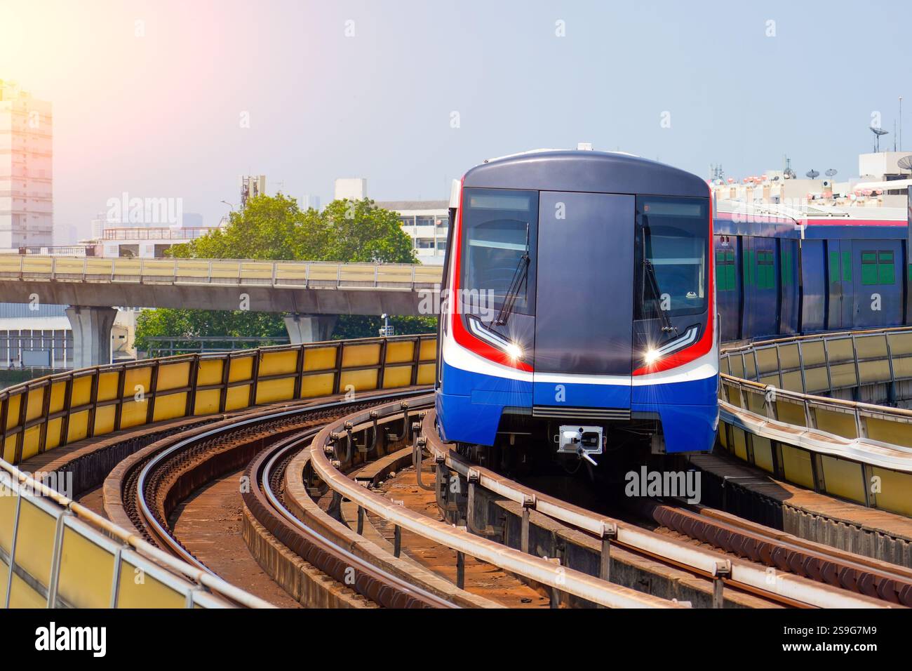 Monorail passenger train passes hi-res stock photography and images - Alamy