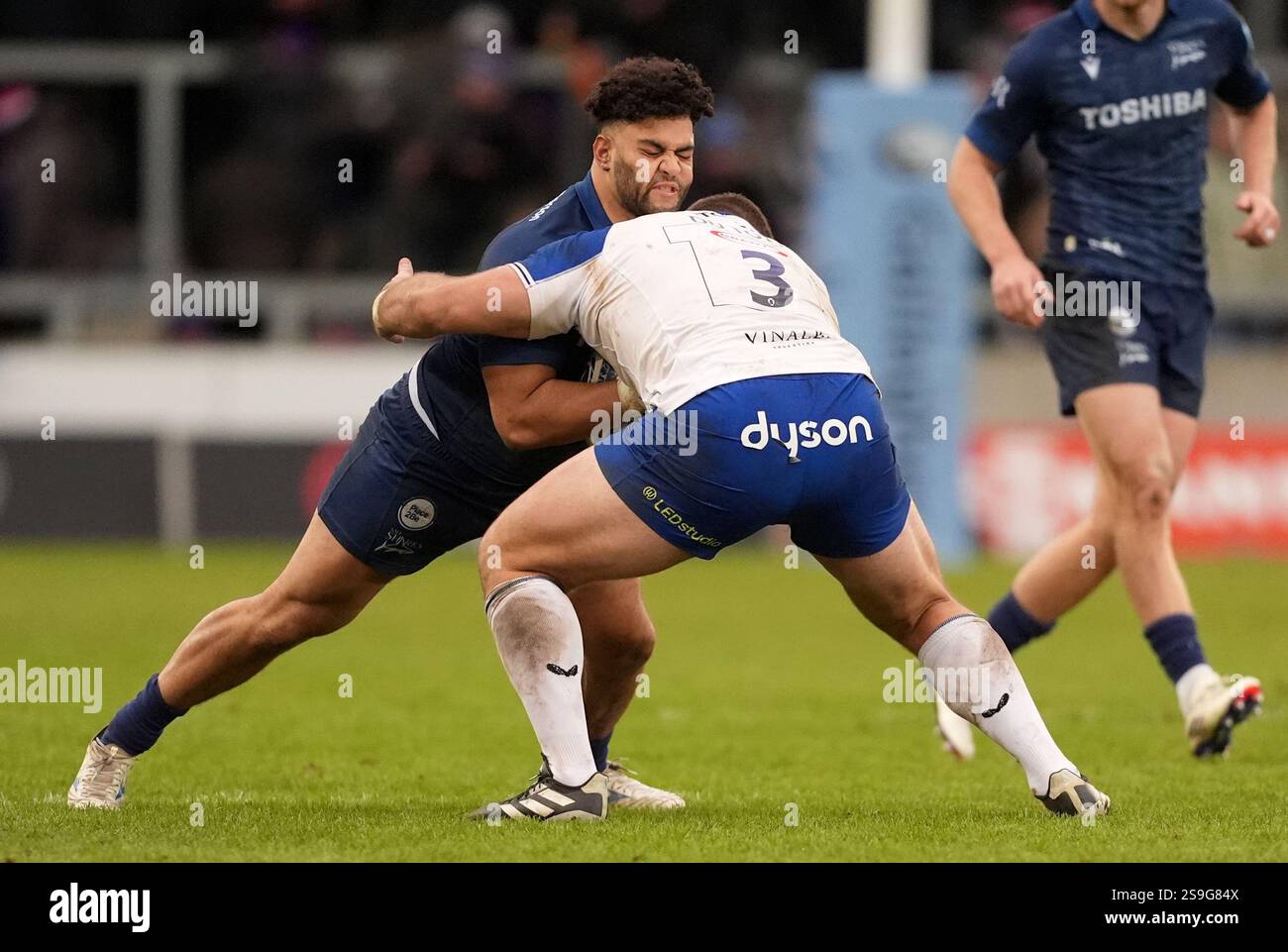 Sale Sharks' Tye Raymont (left) is tackled by Bath's Thomas du Toit ...