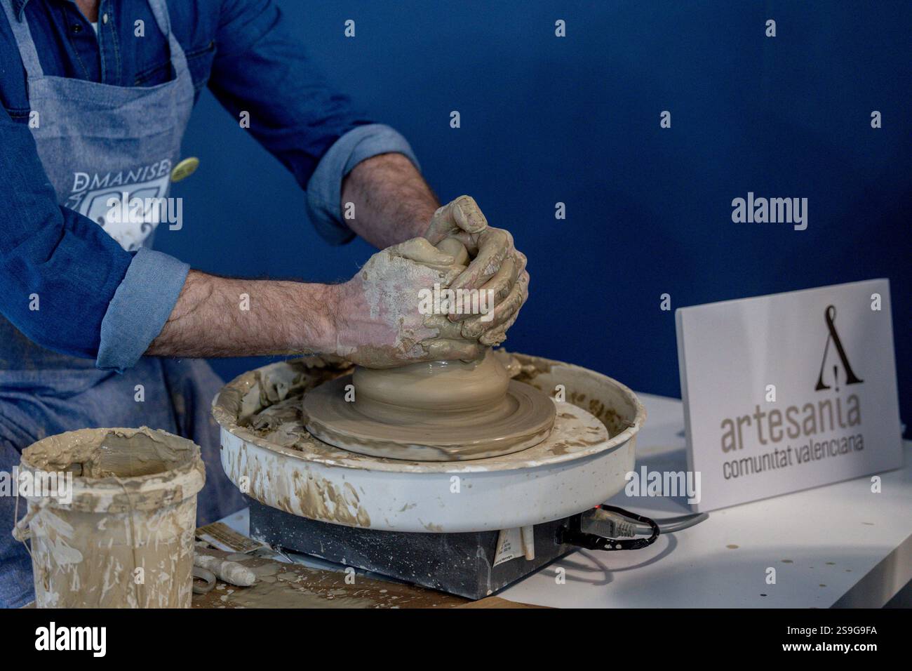A person at a stand during the International Tourism Fair (Fitur), at ...