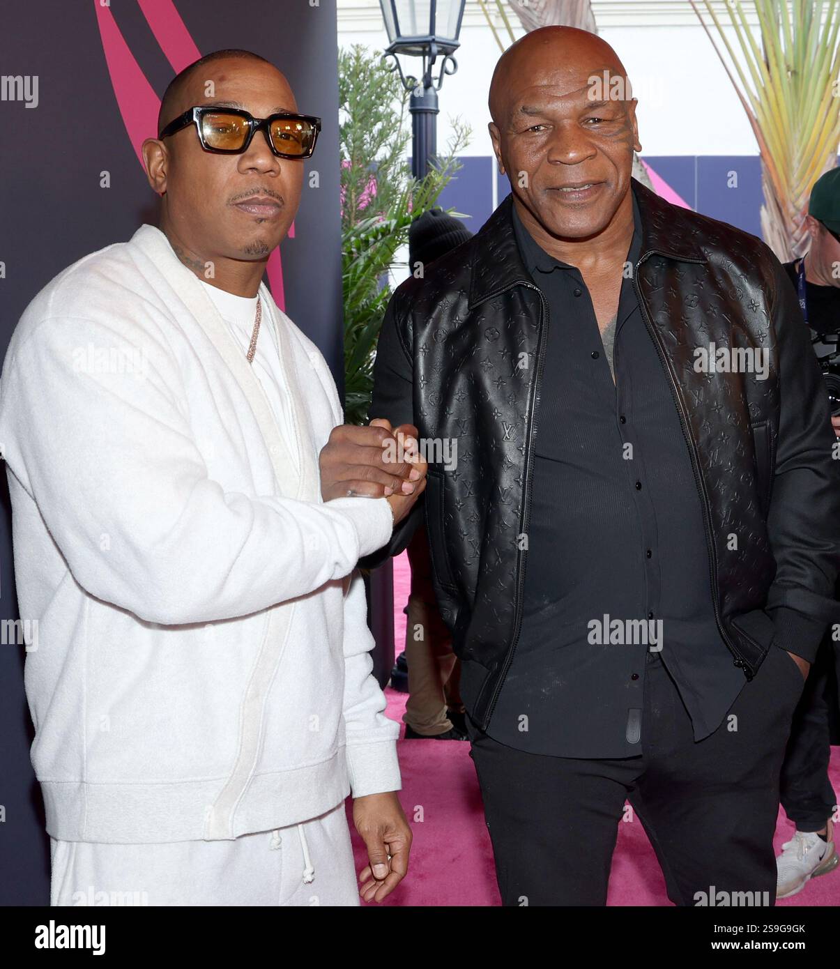 HALLANDALE, FLORIDA - JANUARY 25: Ja Rule, Mike Tyson attends Pegasus ...