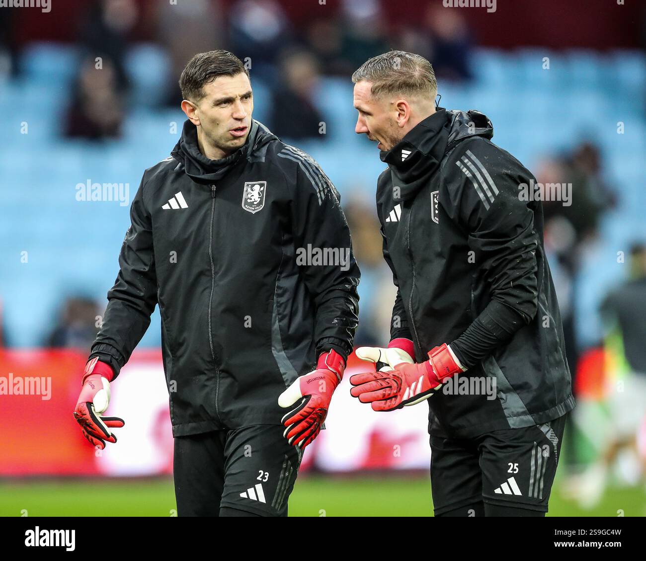 Emiliano Martínez of Aston Villa chats to Robin Olsen of Aston Villa ...
