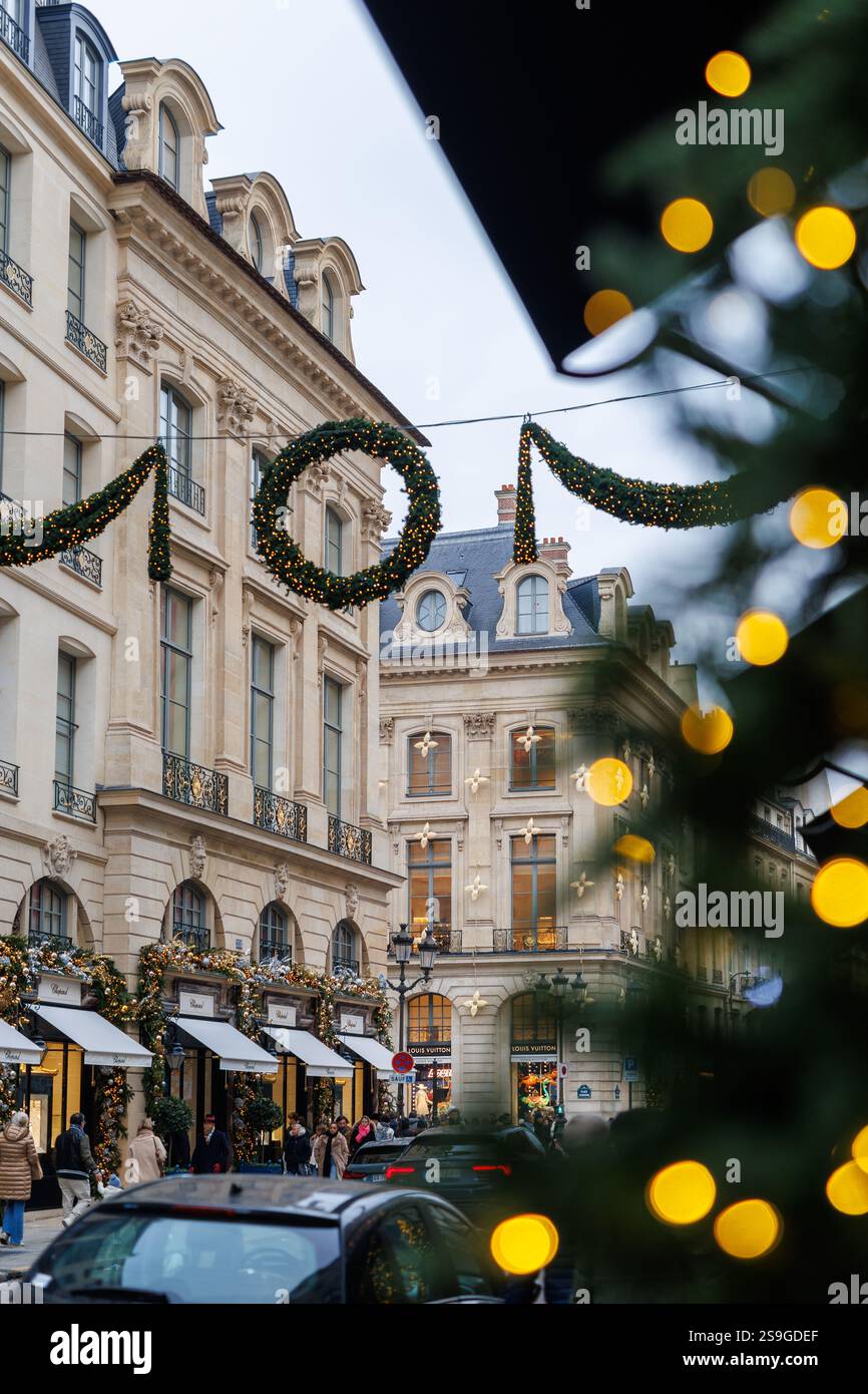 Festive Christmas decorations on Rue Saint-Honoré in Paris during the ...