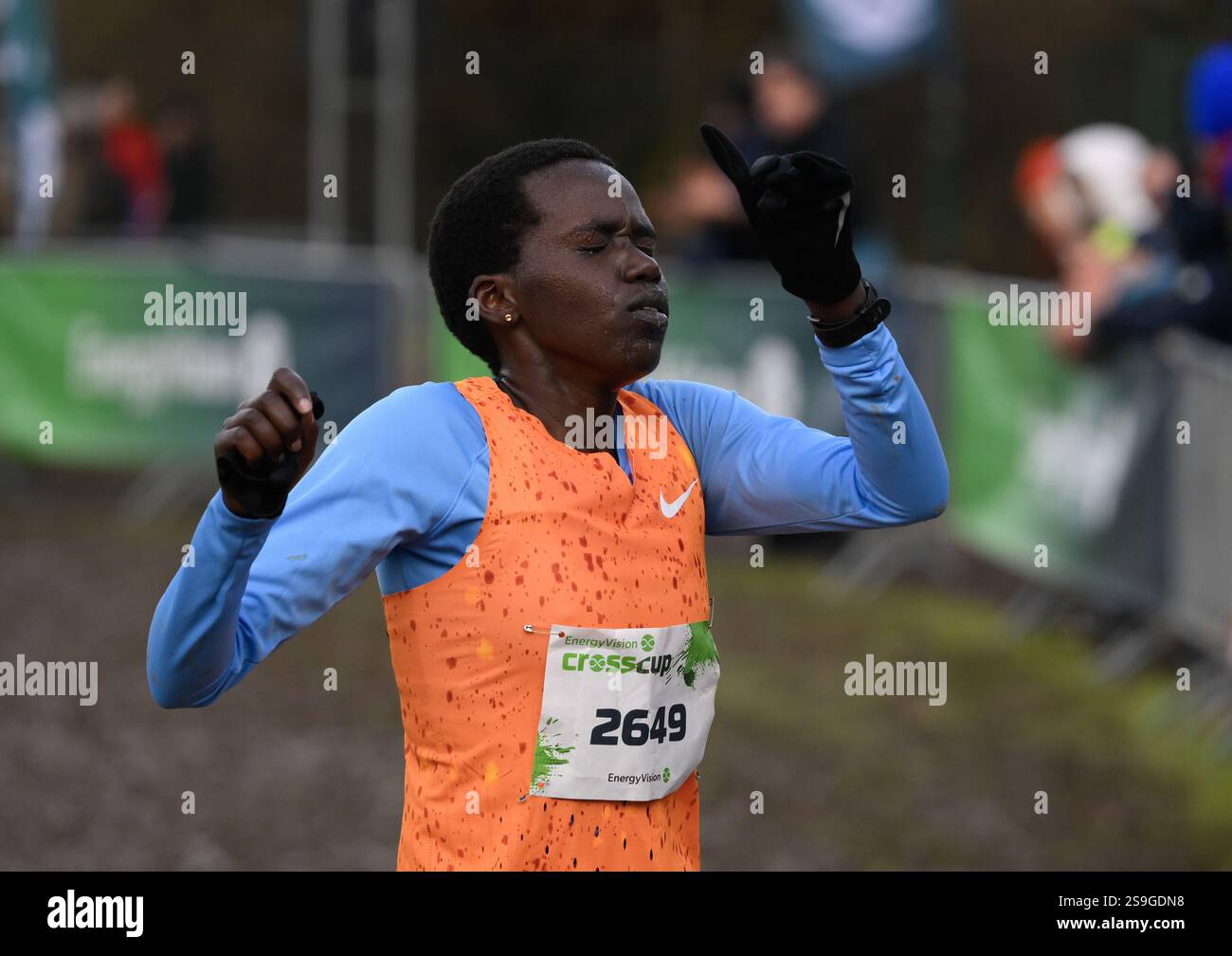 Kenyan Sheila Jebet crosses the finish line to win the women's race at ...