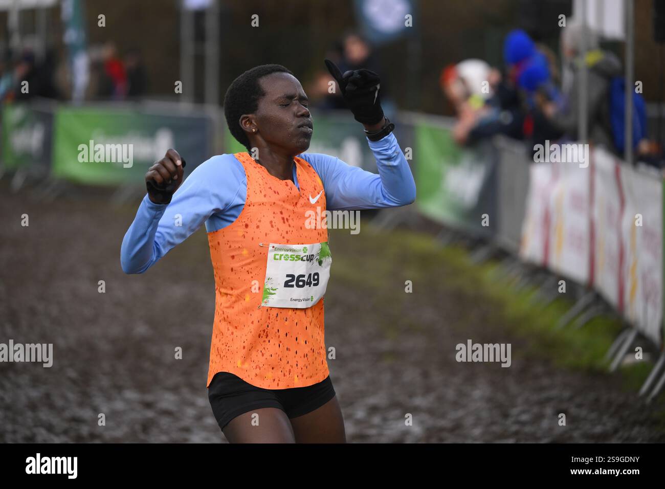 Kenyan Sheila Jebet crosses the finish line to win the women's race at ...