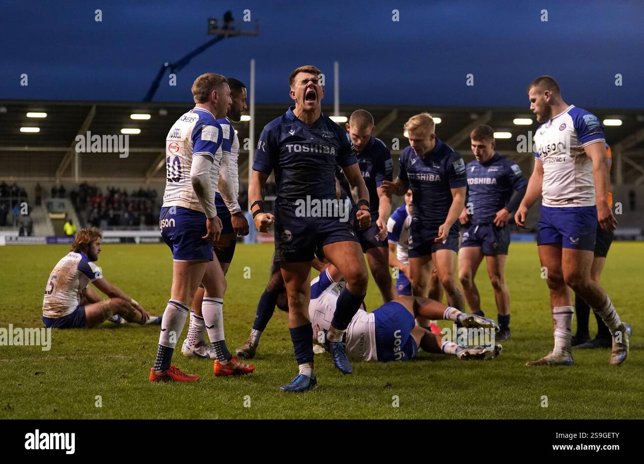Sale Sharks' Joe Carpenter celebrates scoring their side's third try ...