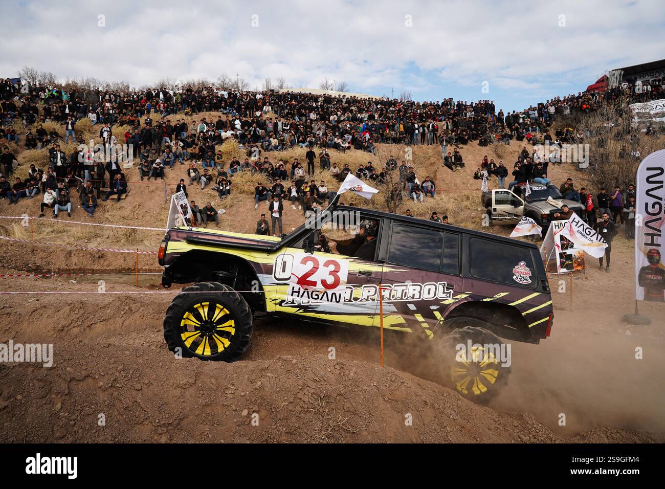An Iraqi Kurd contestant competes in an off-roading sport on the ...