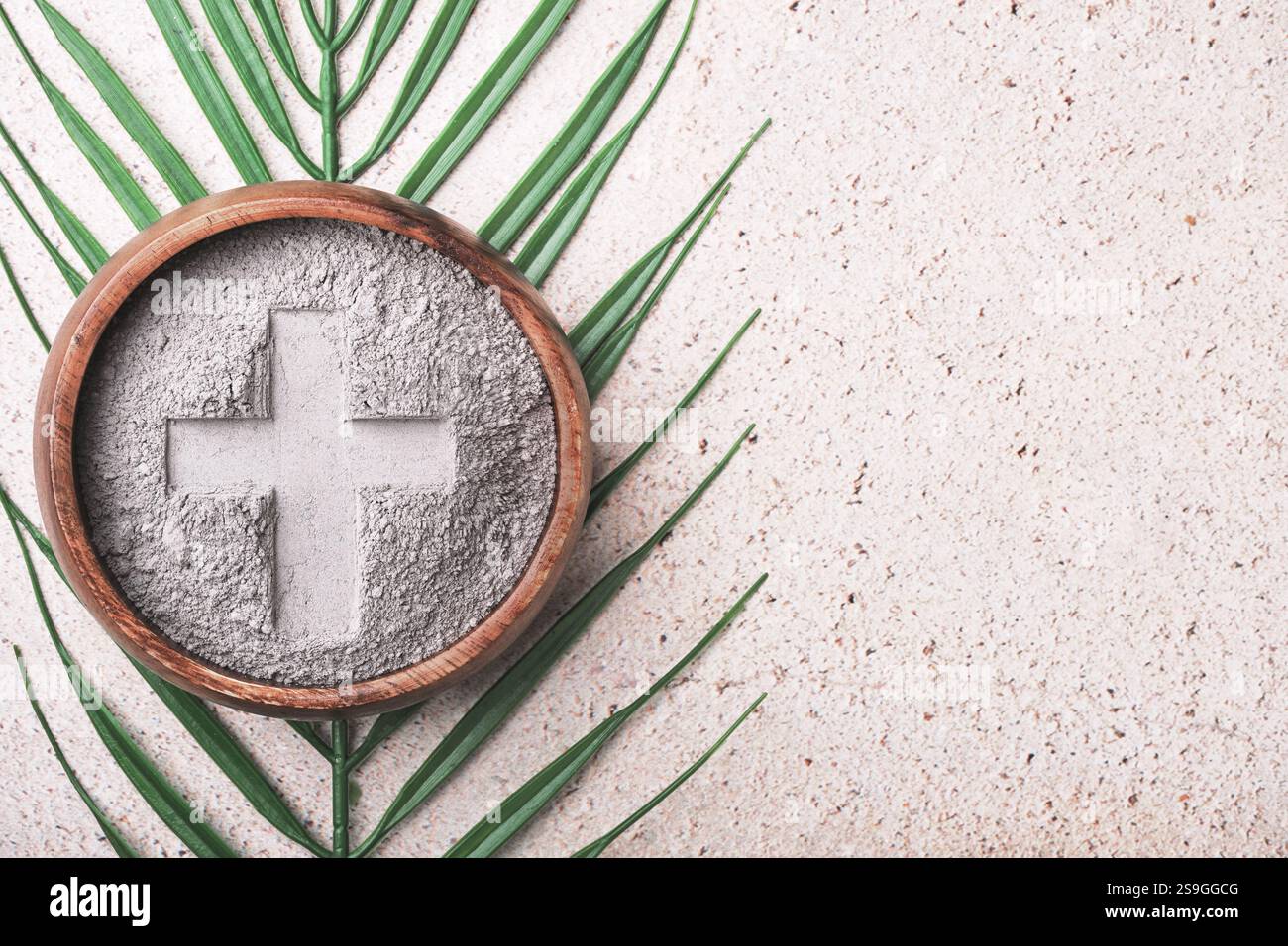 Ash Wednesday symbols cross in ashes and palm leaf Stock Photo - Alamy