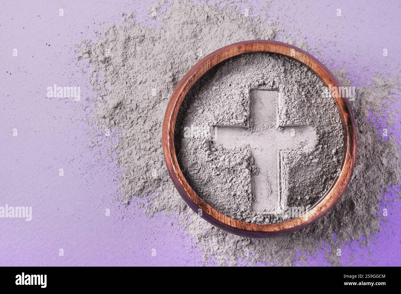 Cross imprint in gray ash on purple background. Ash Wednesday Stock ...
